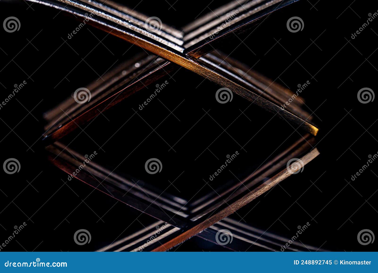 Two Interlocking Forks Reflecting Off a Glossy Black Surface. Silver ...