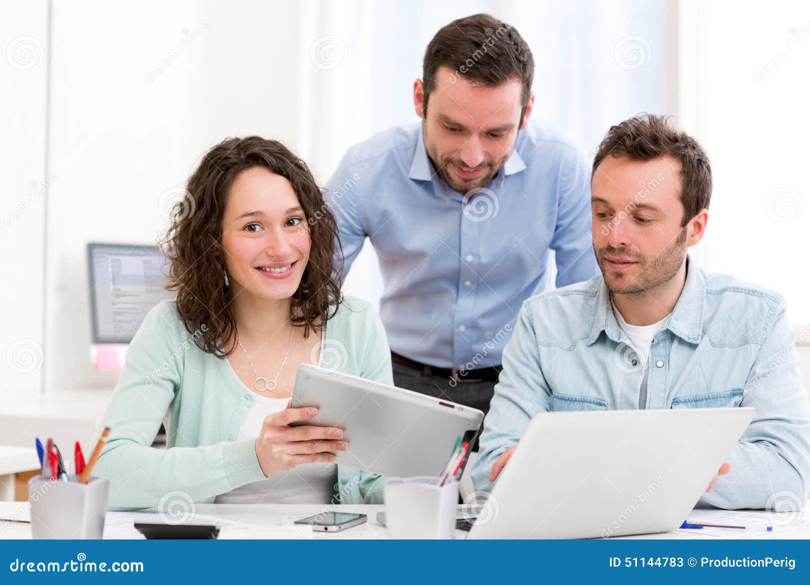 Two Interns Working Together Assisted by Their Course Supervisor Stock ...