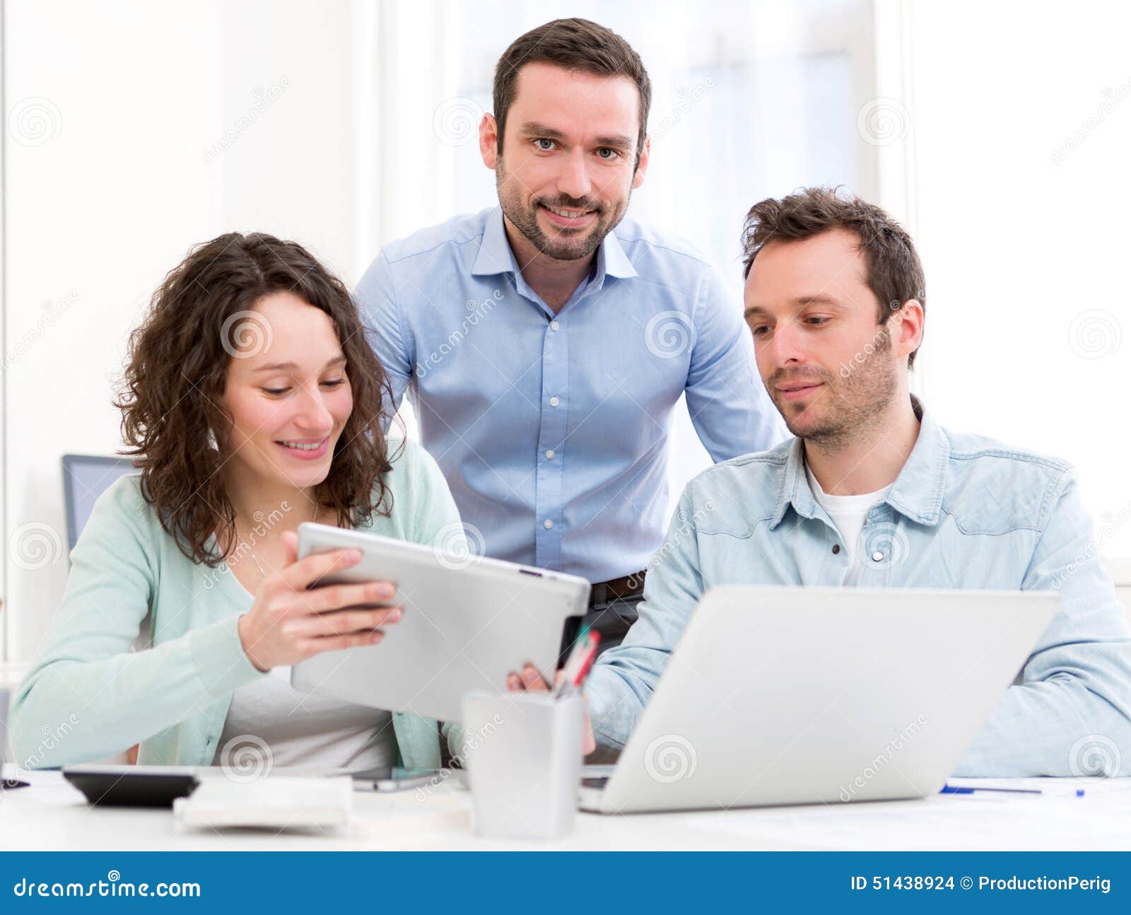 Two Interns Working Together Assisted by Their Course Supervisor Stock ...