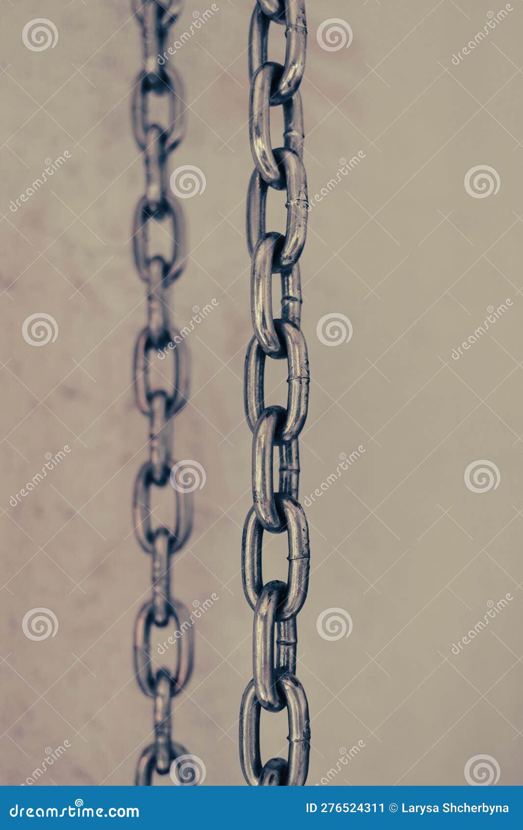 Two Iron Chains Hang Vertically on a Light Background Stock Image ...