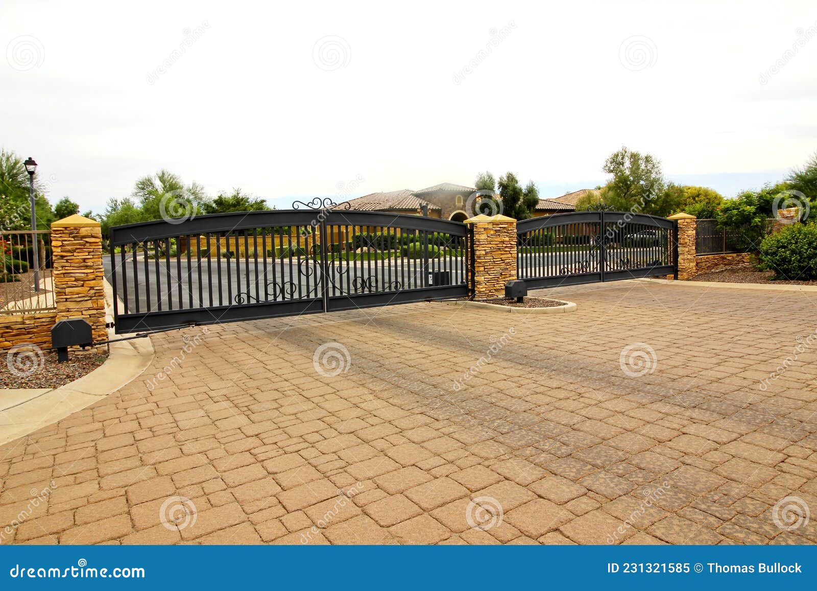 Two Iron Entry and Exit Electric Gates Stock Image - Image of light ...