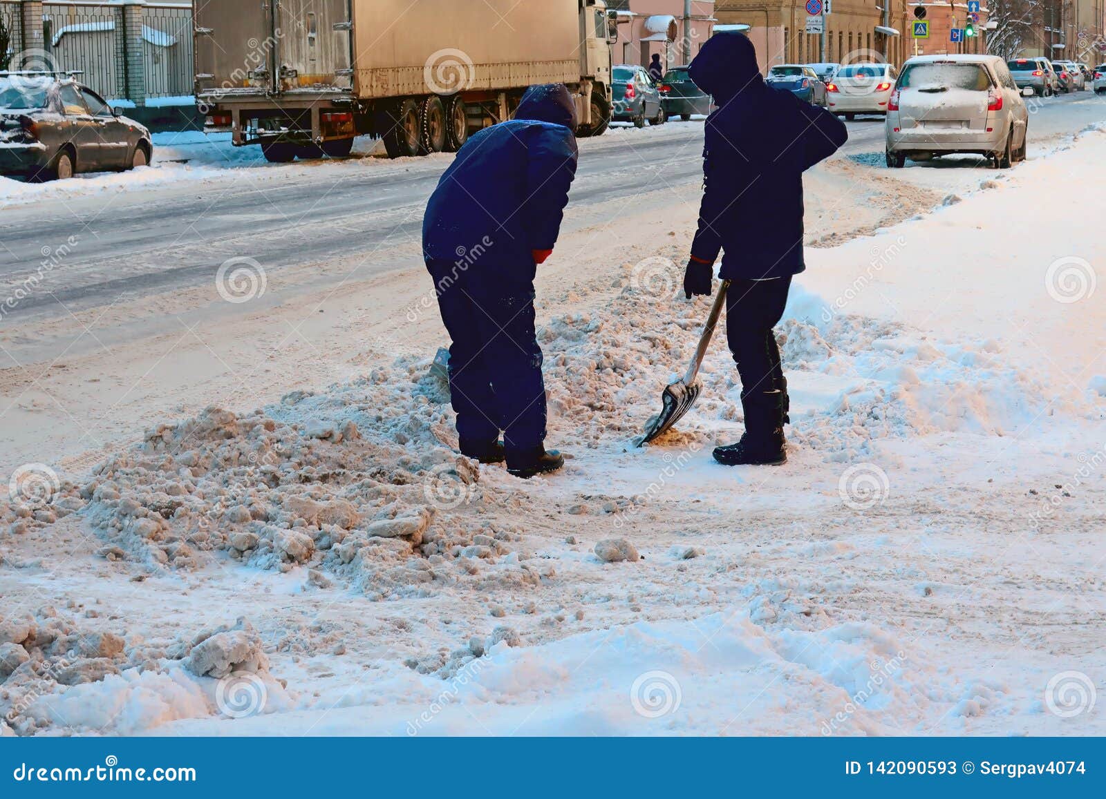 Two Janitors Cleaning Snow on the Sidewalk with Shovels Stock Image ... Two Janitors Cleaning Snow on the Sidewalk with Shovels Stock Image ...