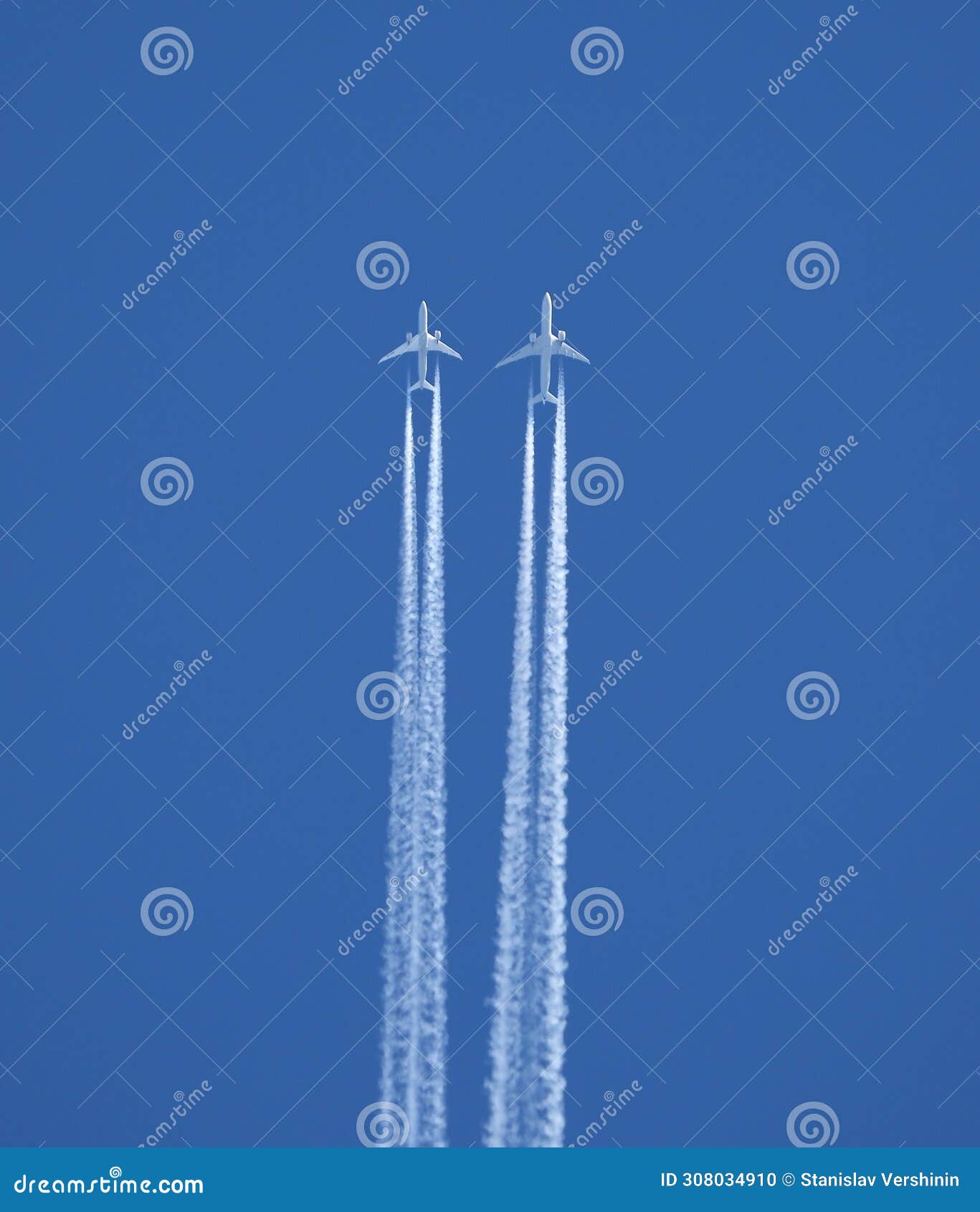 Two Jet Two-turbine Aircraft in Flight on Blue Sky Background Stock ...