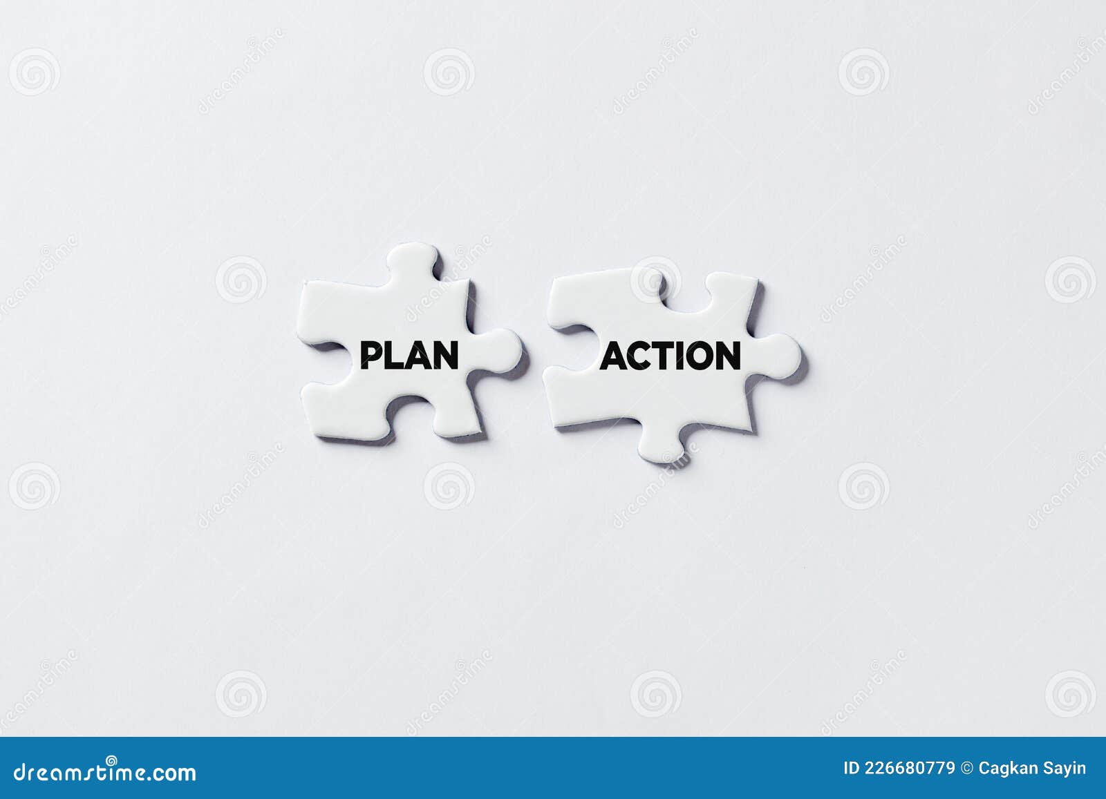 Two Jigsaw Puzzle Pieces is Connecting with the Words Plan and Action ...