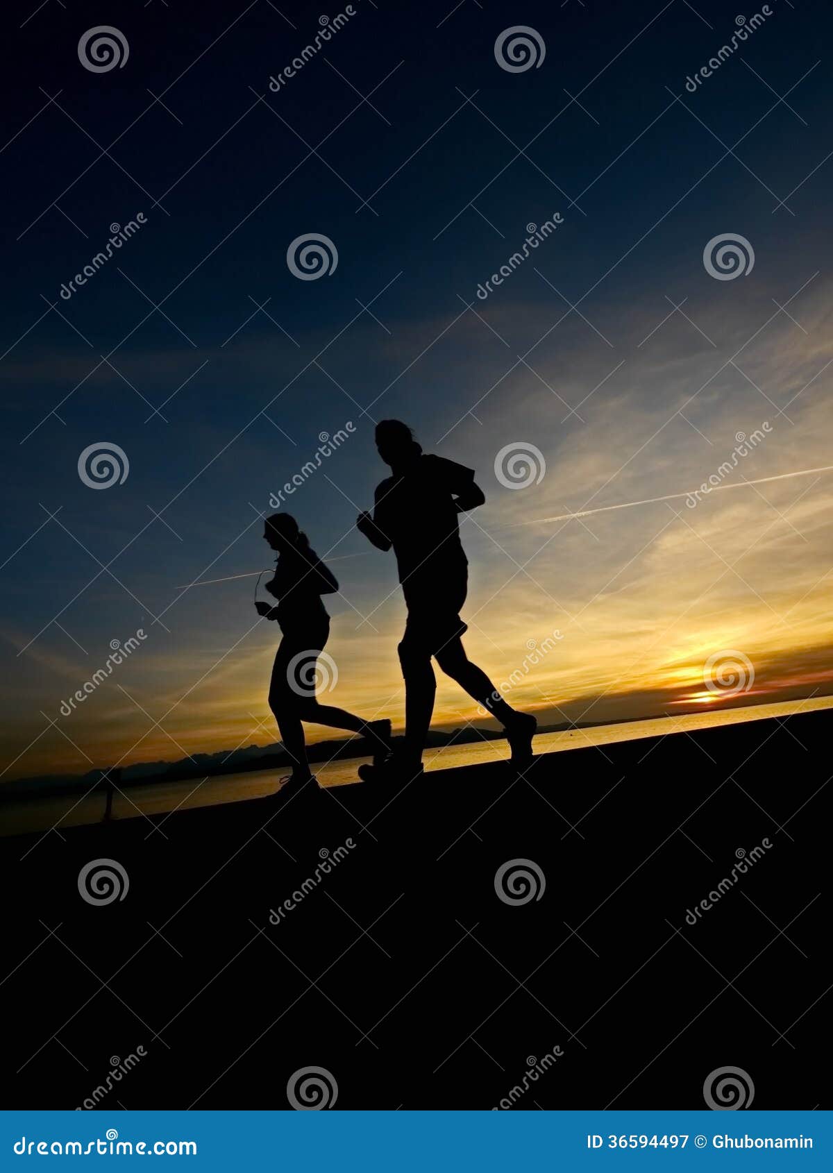Two joggers sunset stock image. Image of running, adult - 36594497