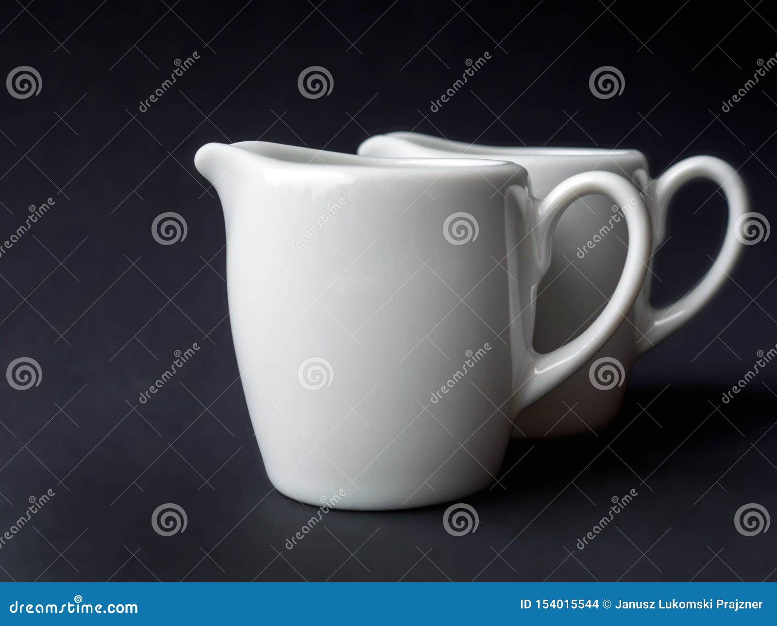 Two jugs for coffee cream stock photo. Image of coffee - 154015544
