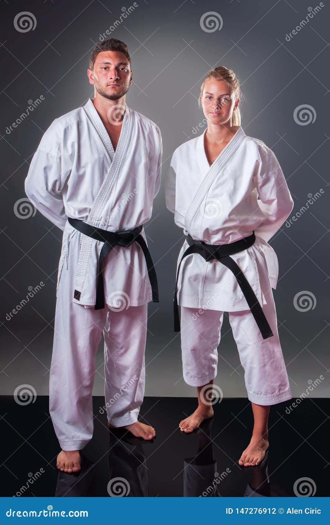 Two Karate Players Posing on the Gray Background Stock Photo - Image of ...