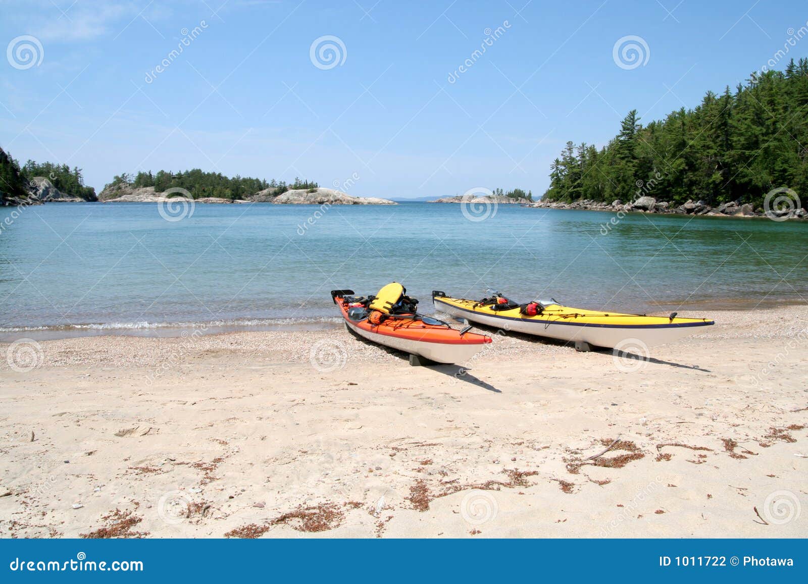 Two Kayaks on the Beach stock photo. Image of park, kayaks - 1011722