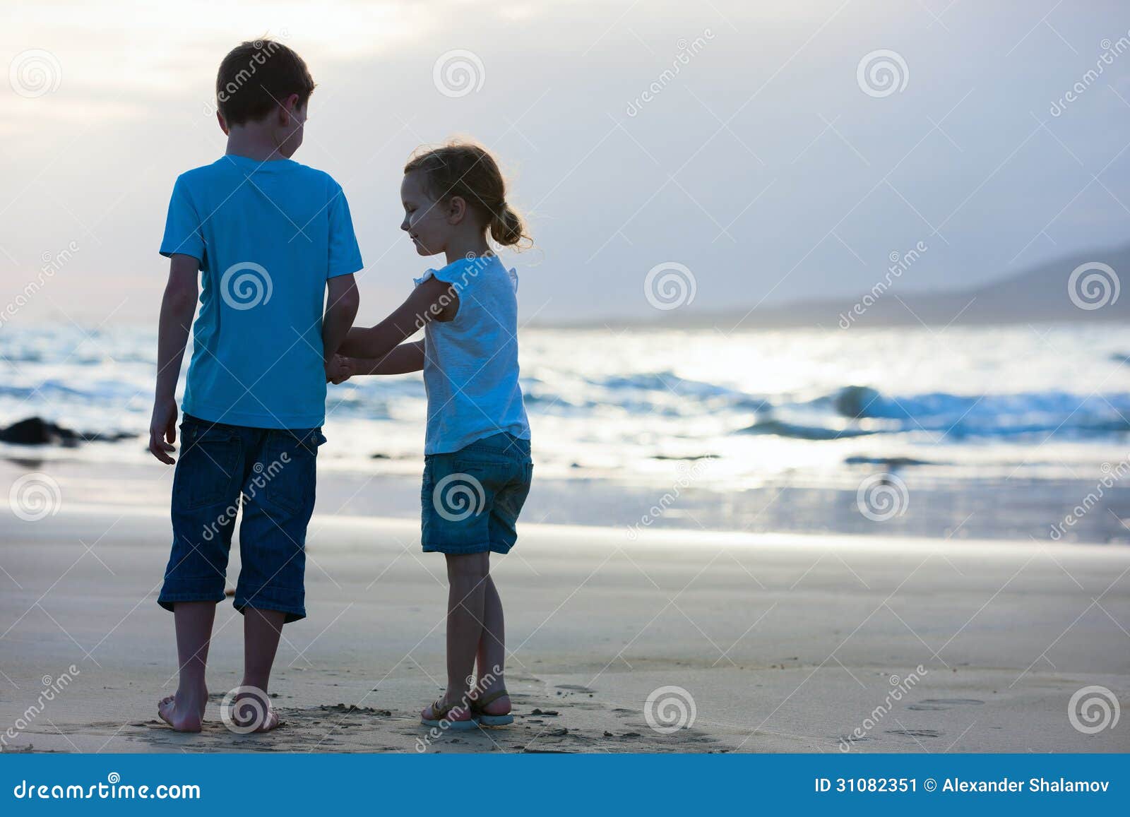 Two kids at beach stock image. Image of sister, people - 31082351