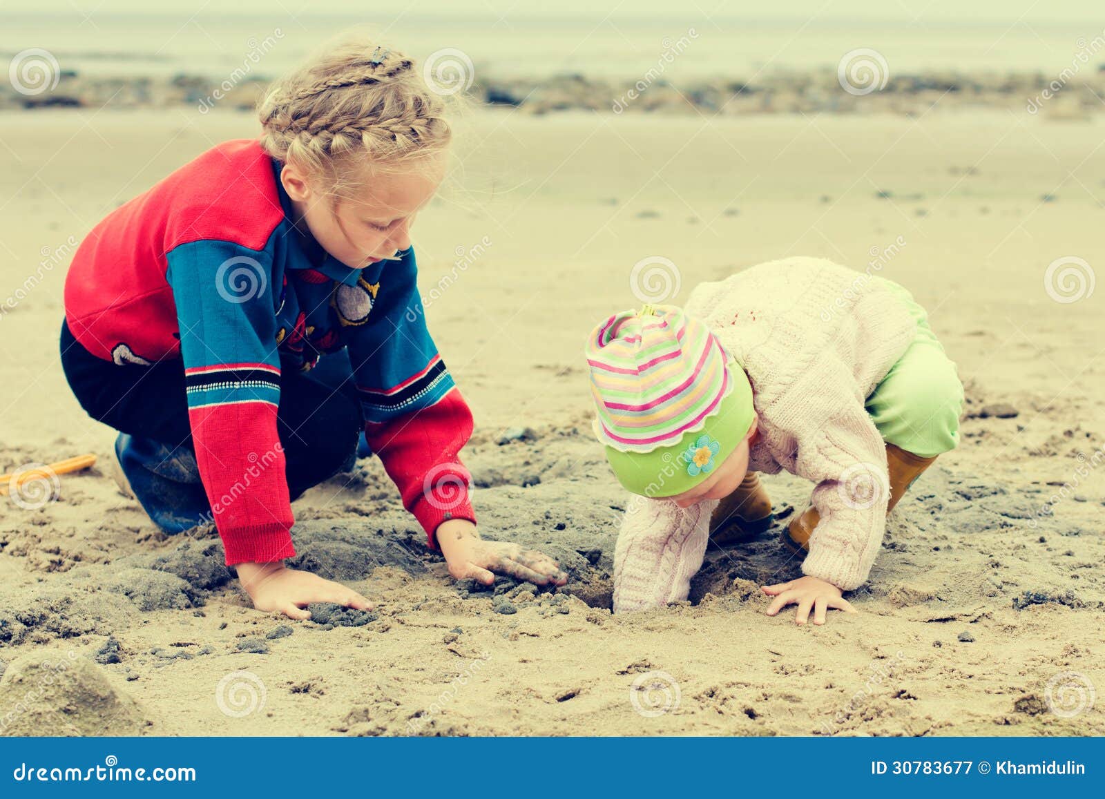 Two kids on the beach. stock image. Image of lonely, cute - 30783677