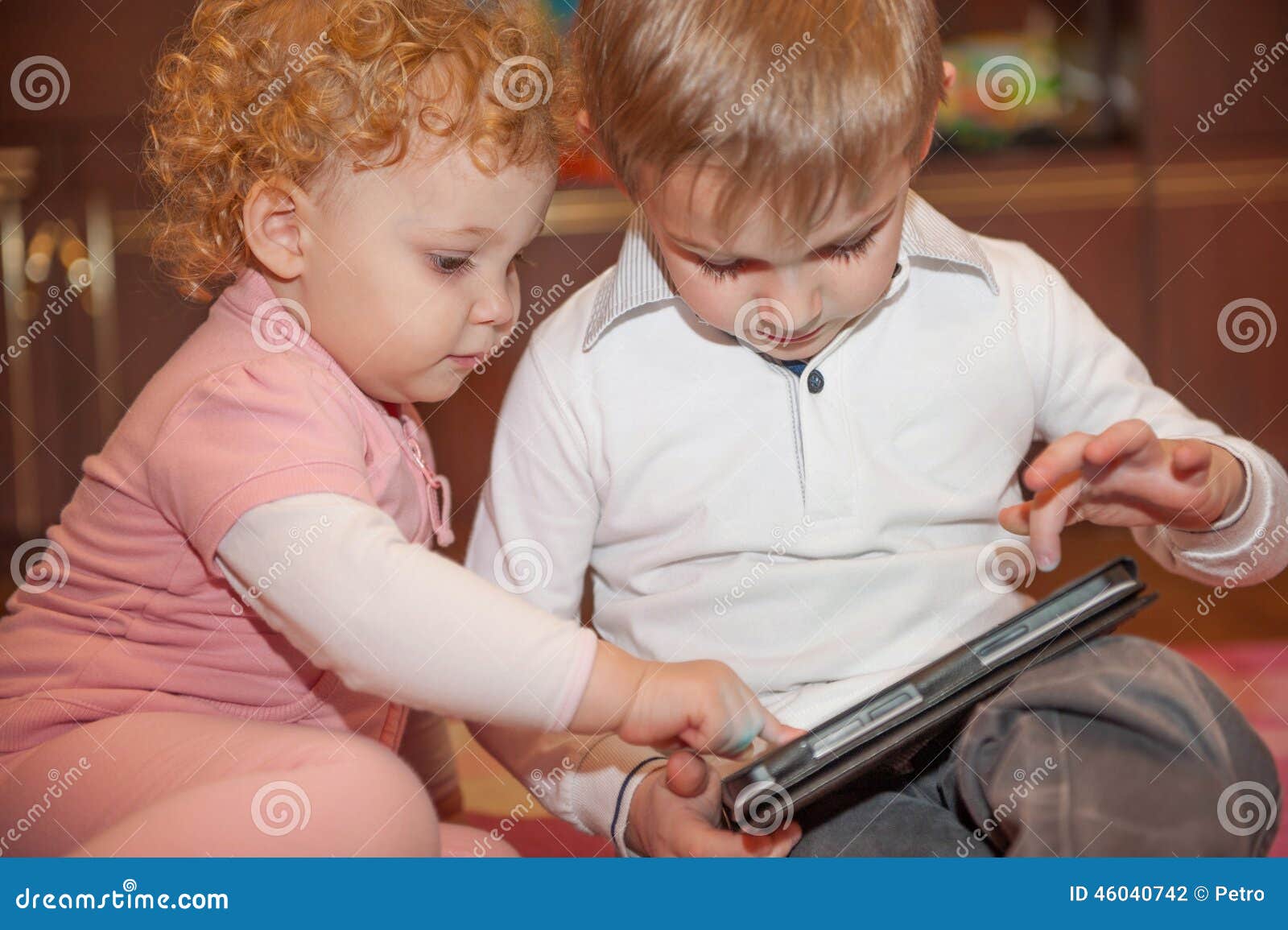 Two Kids with Digital Tablet Stock Photo - Image of game, cheerful ...