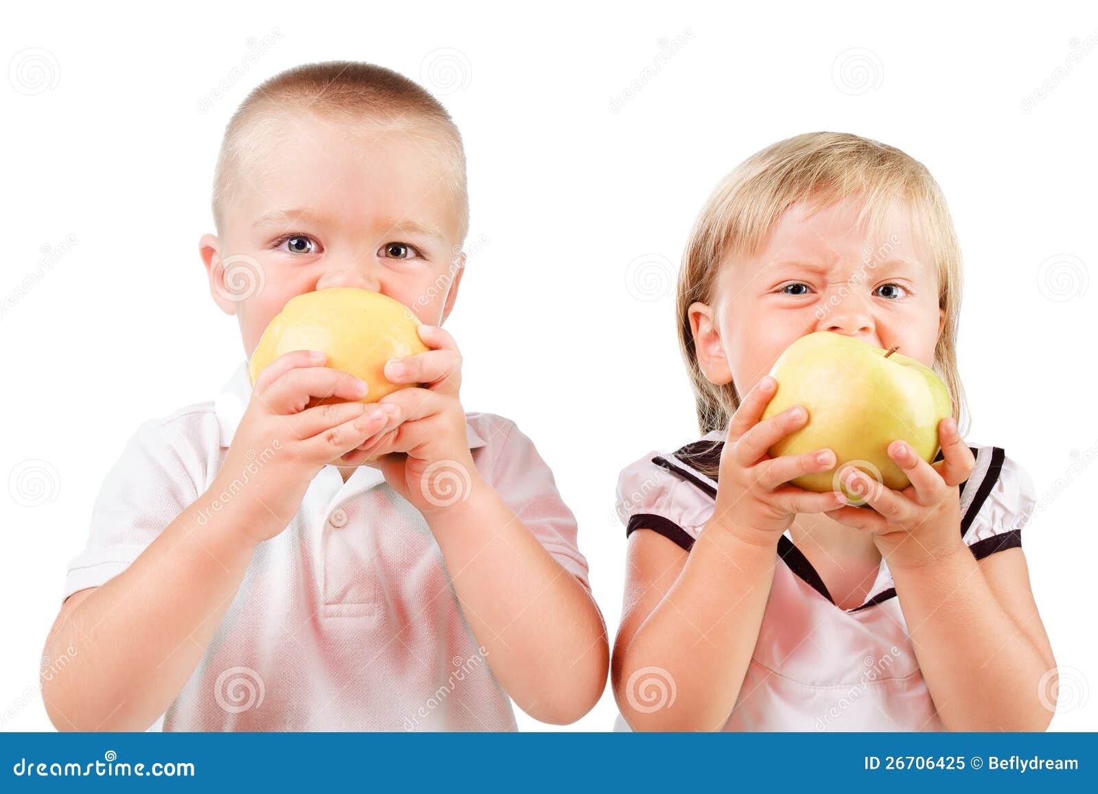 Two Kids Eating Yellow Apples Isolated Over White Stock Image - Image ...