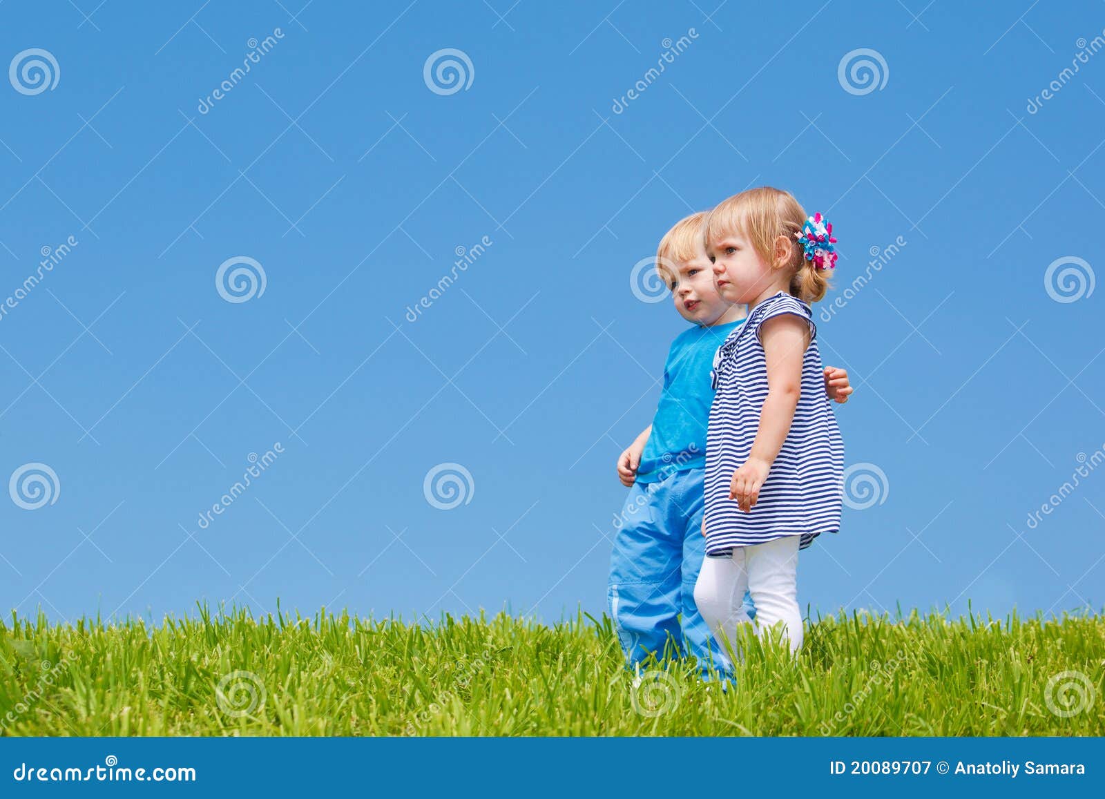 Two kids embracing stock image. Image of green, emotions - 20089707