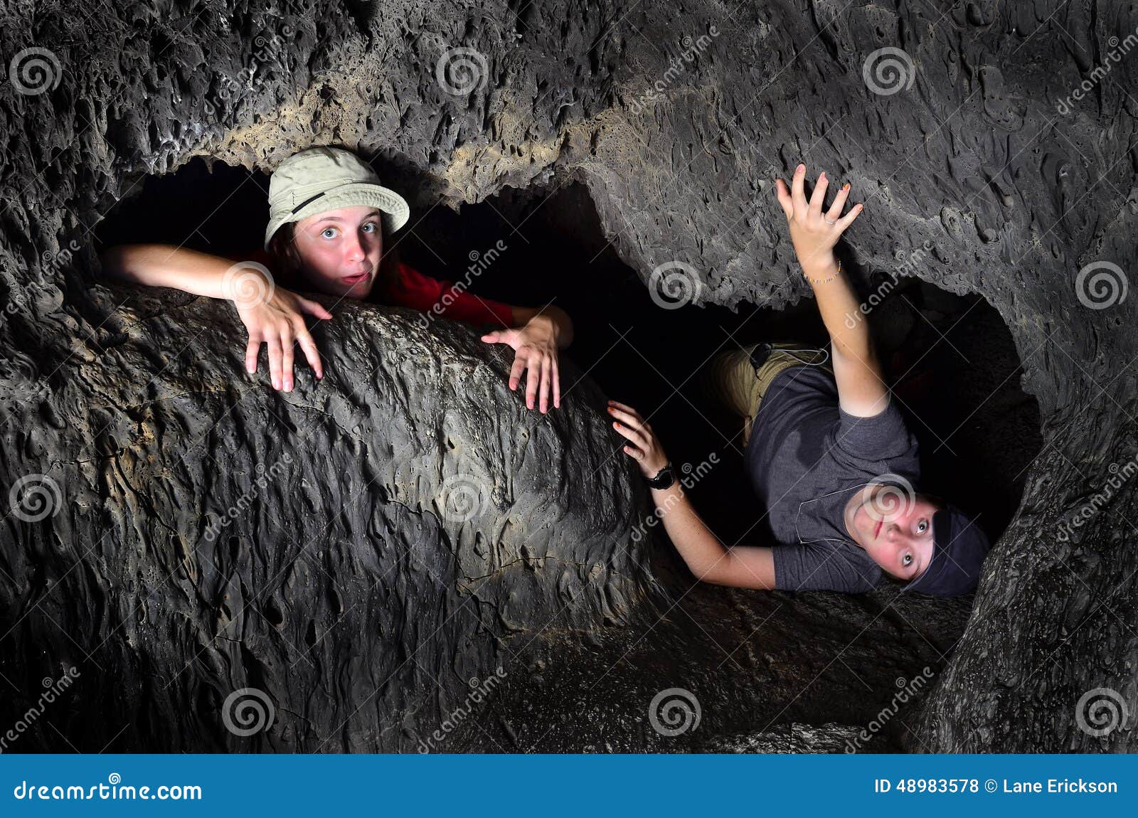 Two Kids Exploring Cave stock photo. Image of beautiful - 48983578