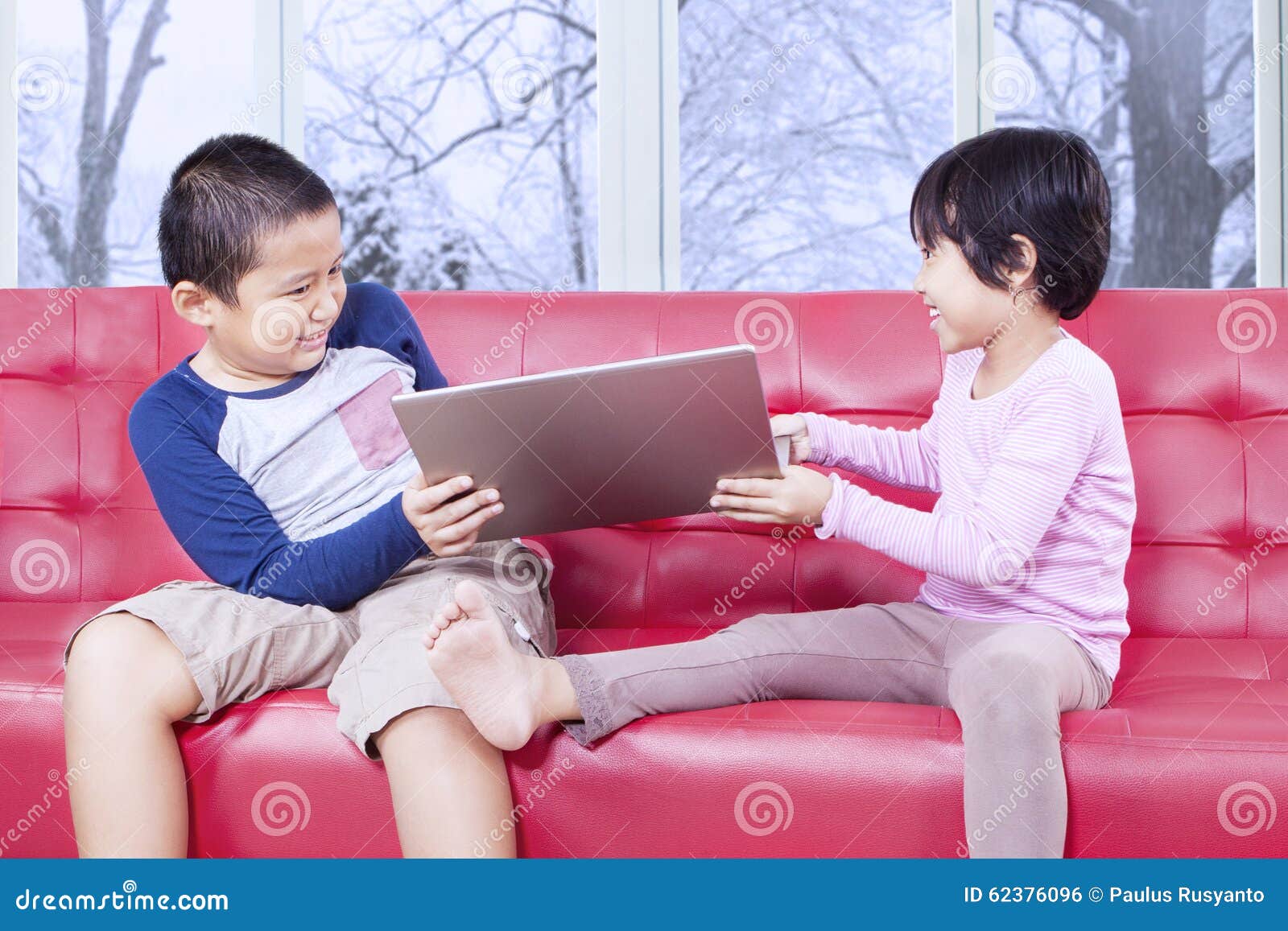 Two Kids Fighting To Take Over Laptop Stock Photo - Image of portrait ...