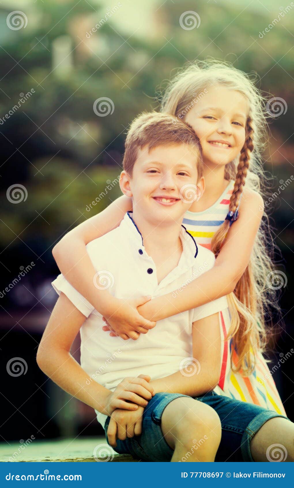 Two kids hugs stock image. Image of happy, cheerful, leisure - 77708697