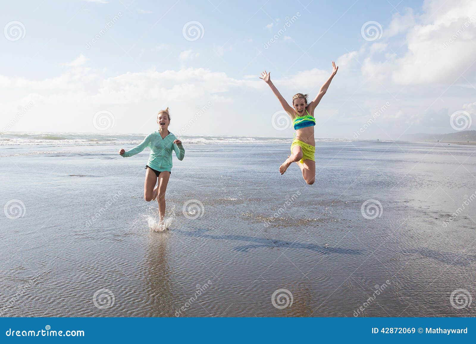 Two Kids Jumping at the Beach Stock Image - Image of kids, activity ...
