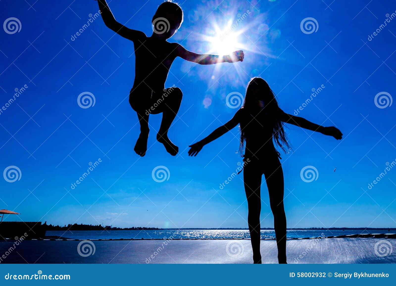 Two Kids Jumping on Trampoline Stock Photo - Image of summer ...