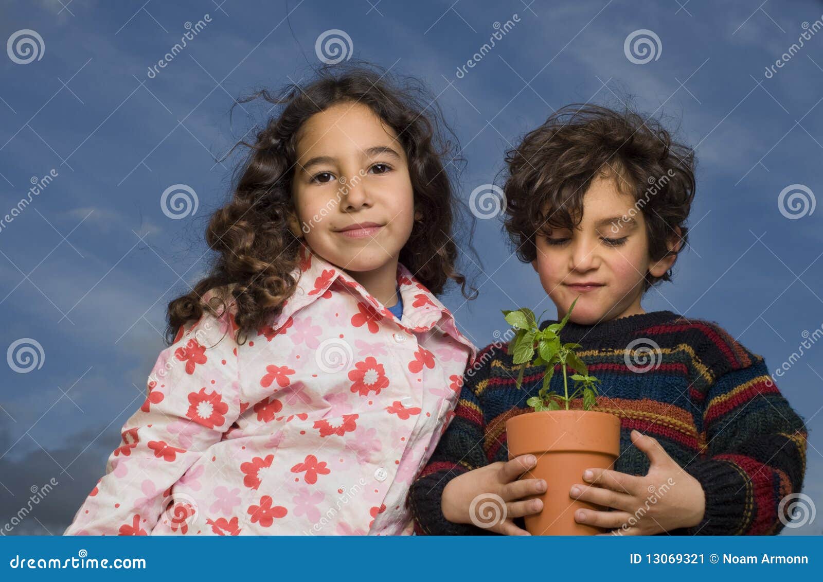 Two Kids Plant Pot Stock Photo | CartoonDealer.com #13069308