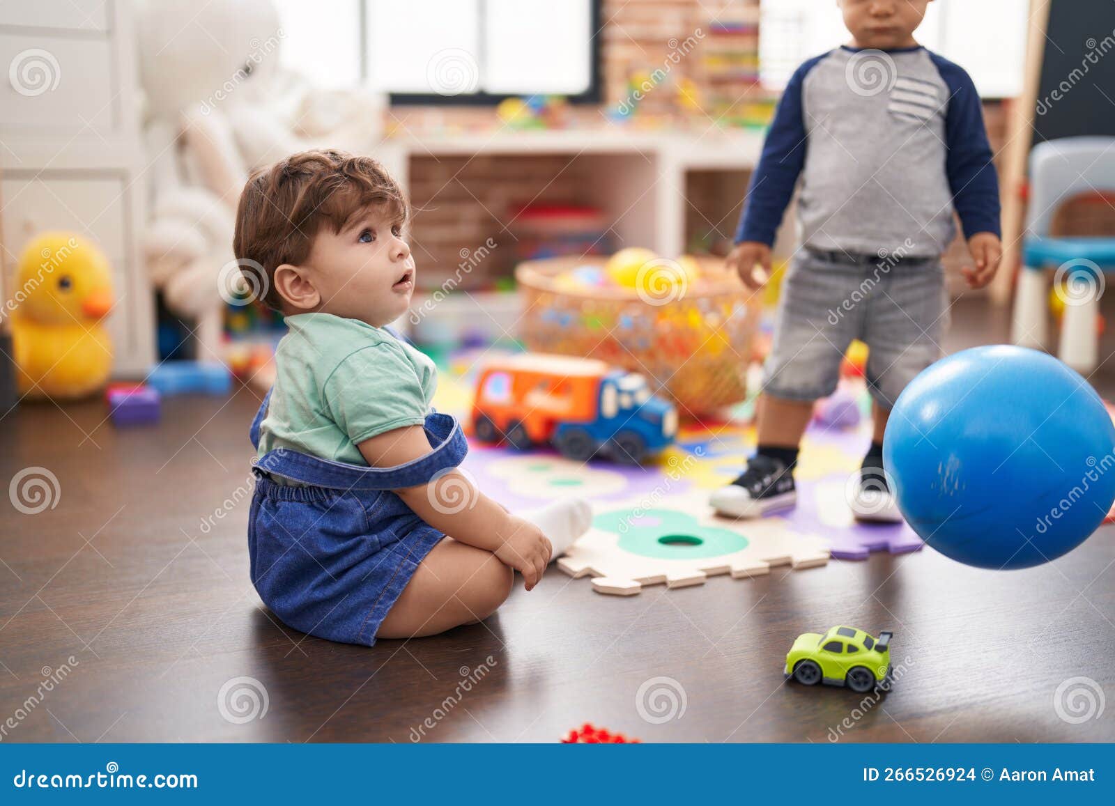 Two Kids Playing with Ball Standing at Kindergarten Stock Photo - Image ...
