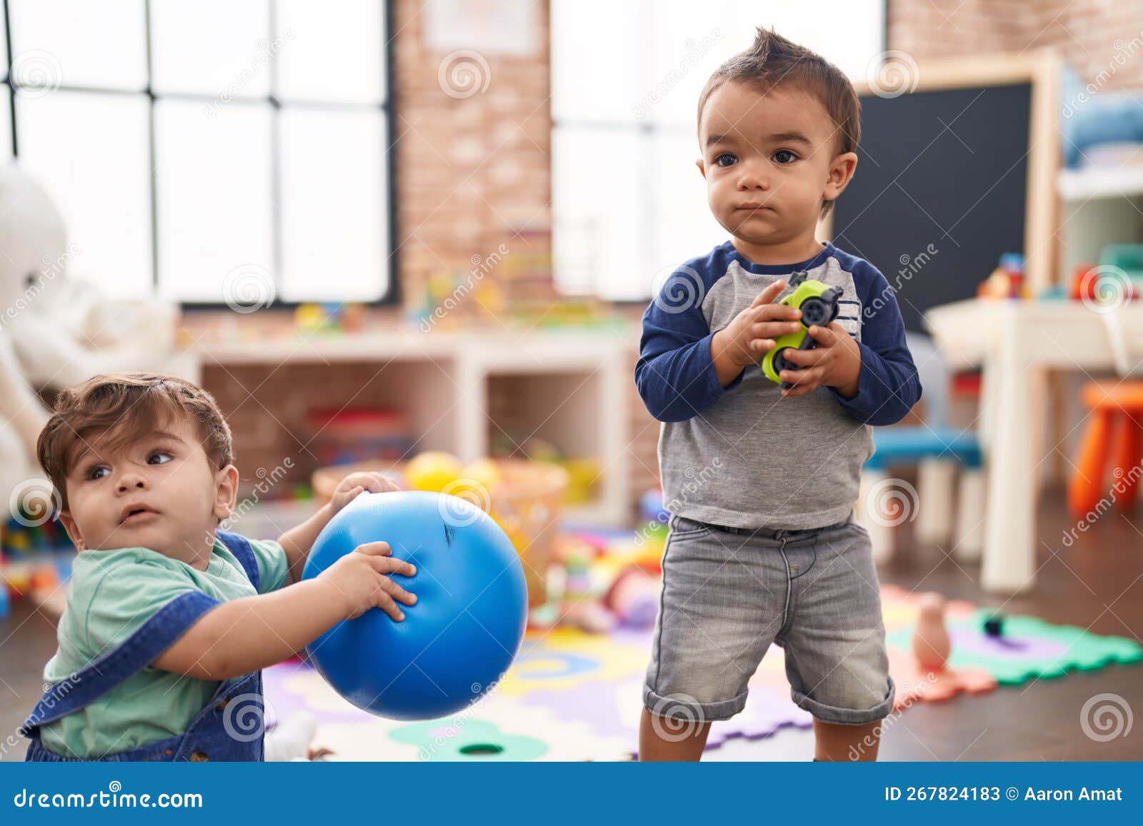 Two Kids Playing with Ball Standing at Kindergarten Stock Image - Image ...