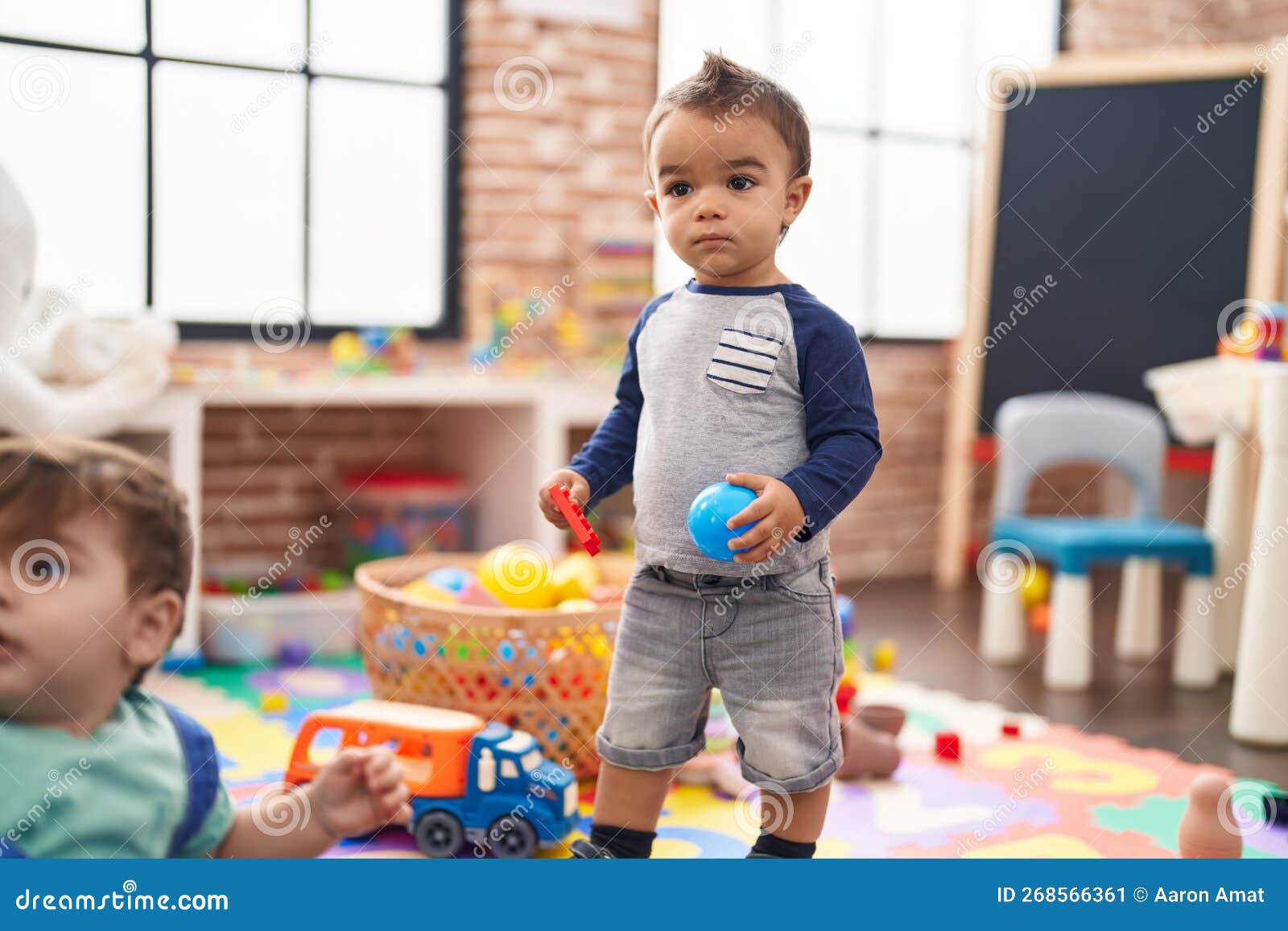 Two Kids Playing with Ball Standing at Kindergarten Stock Image - Image ...
