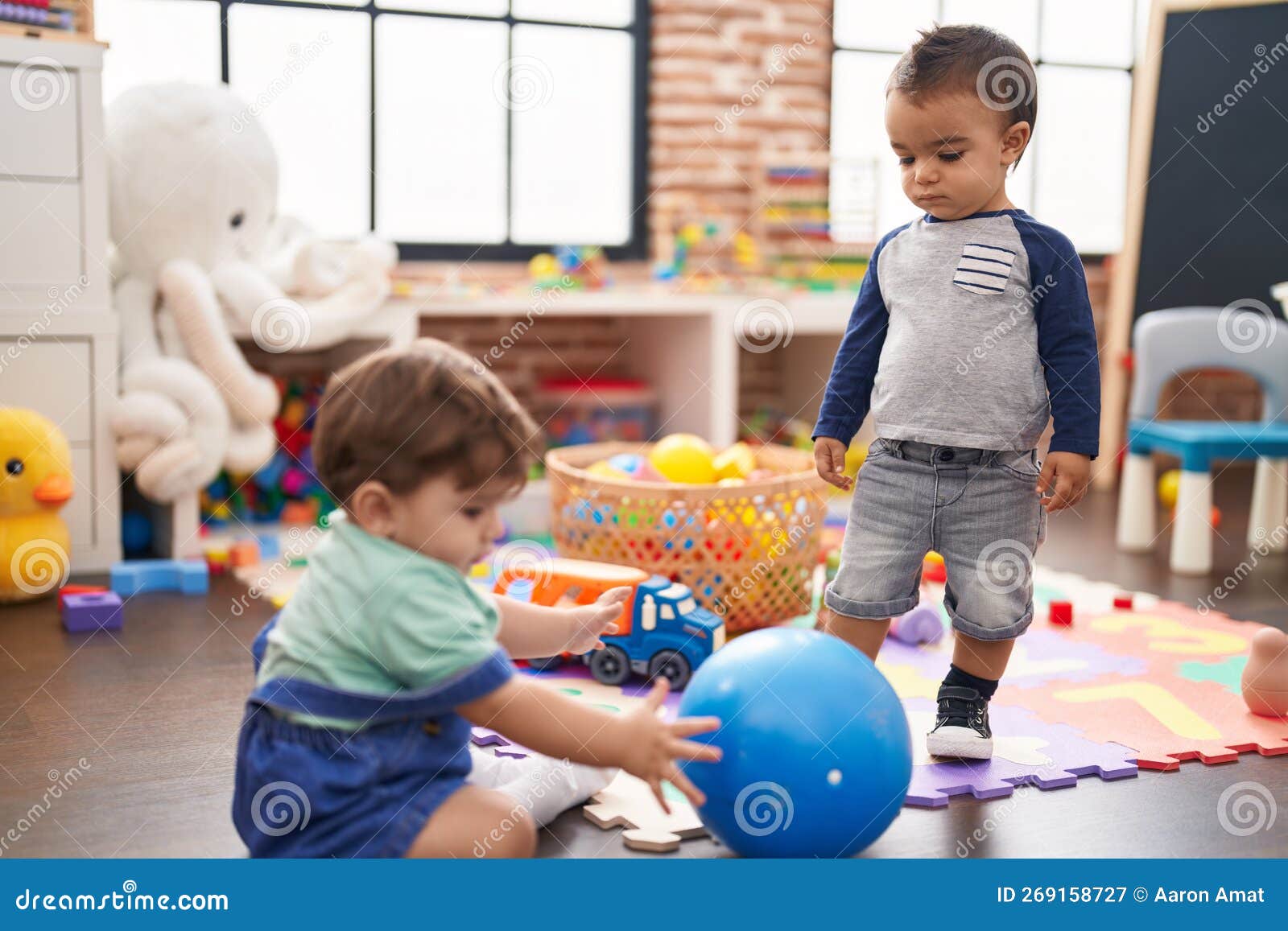 Two Kids Playing with Ball Standing at Kindergarten Stock Image - Image ...