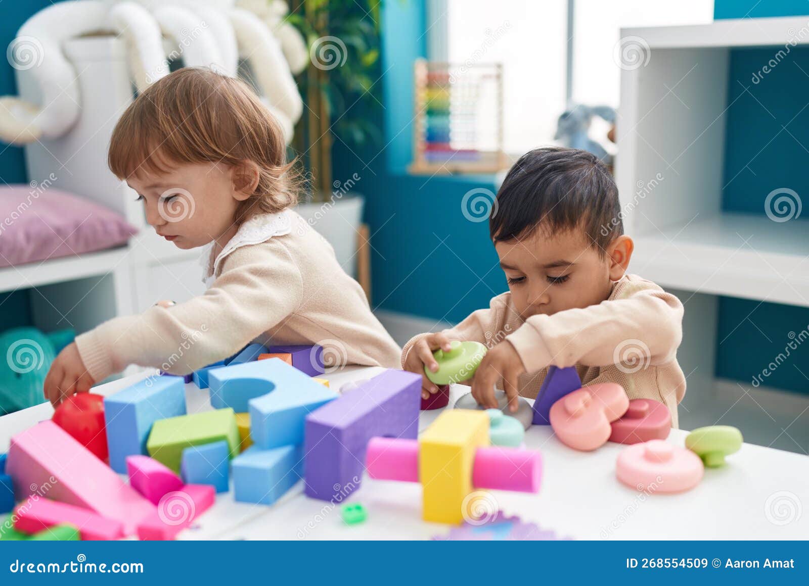 Two Kids Playing with Construction Blocks Standing at Kindergarten ...