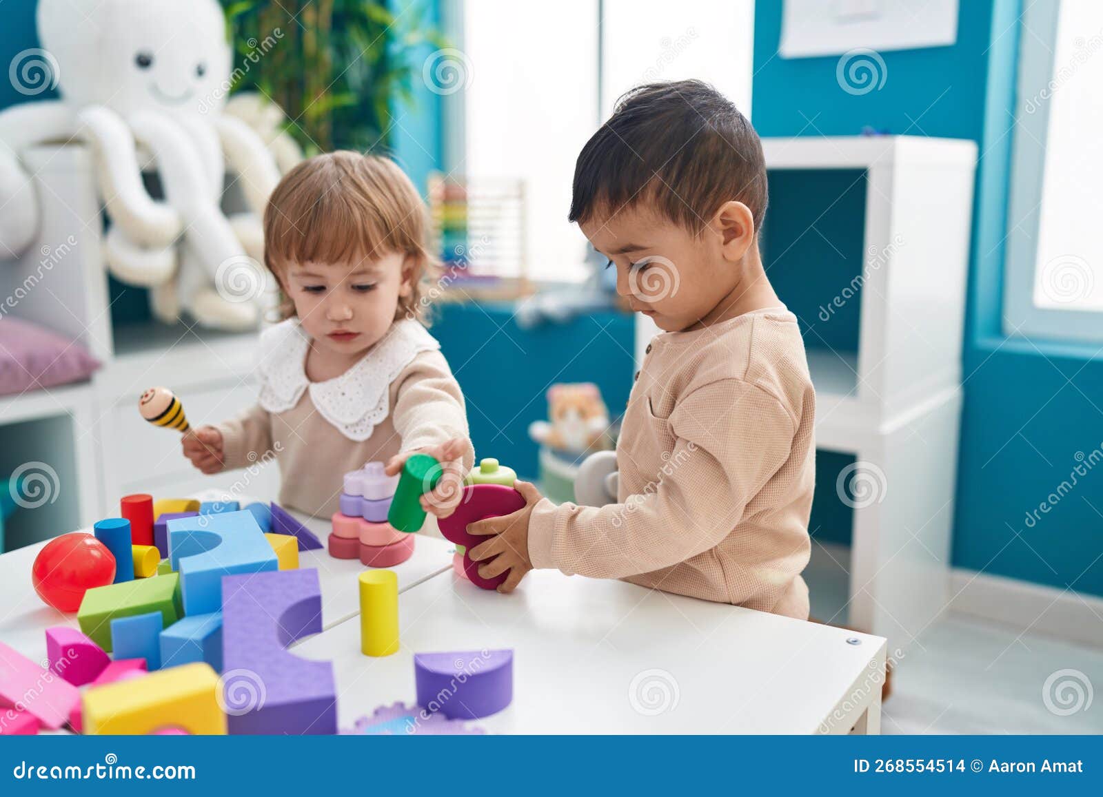 Two Kids Playing with Construction Blocks Standing at Kindergarten ...