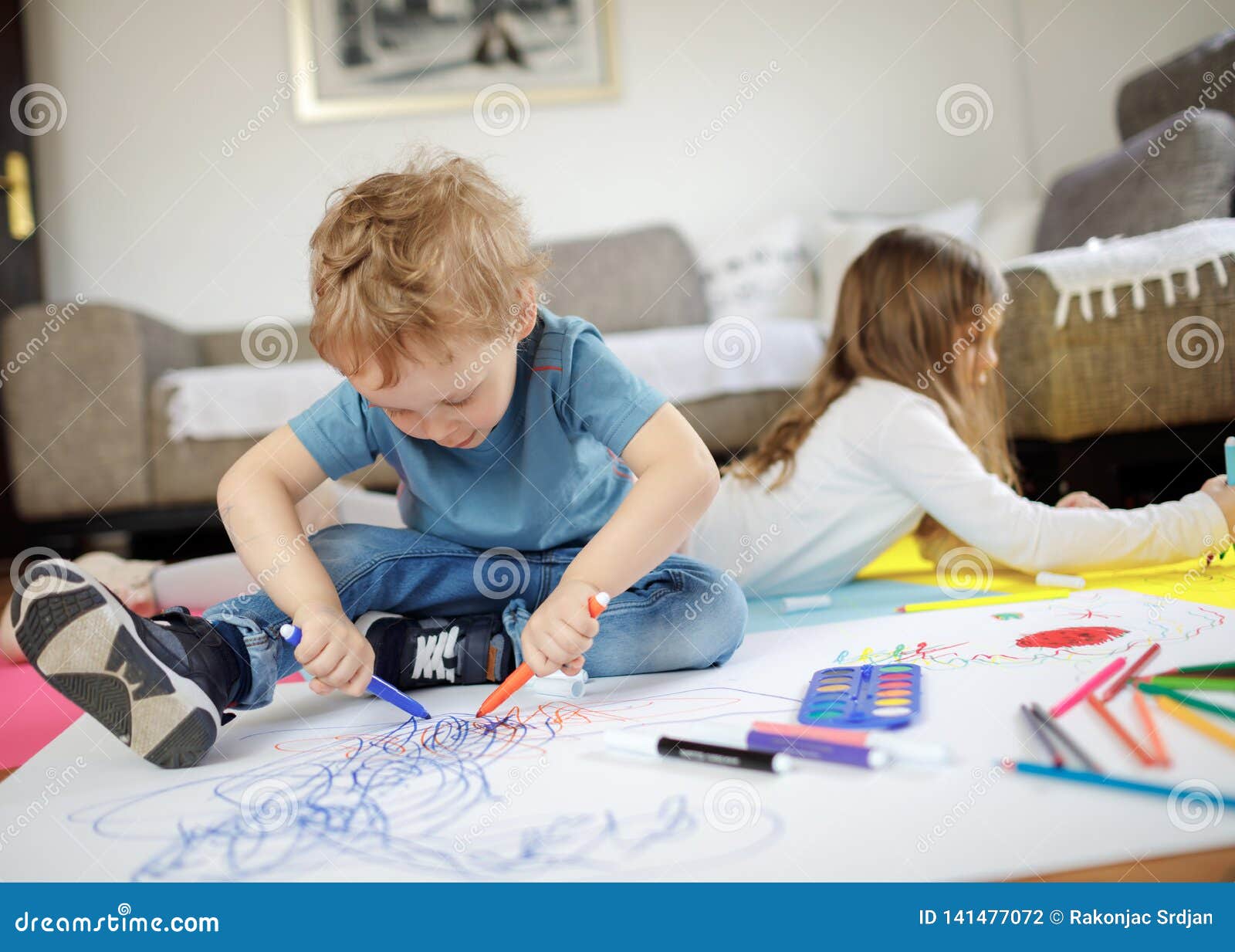 Two Kids are Playing and Drawing on the Floor. Stock Photo - Image of ...