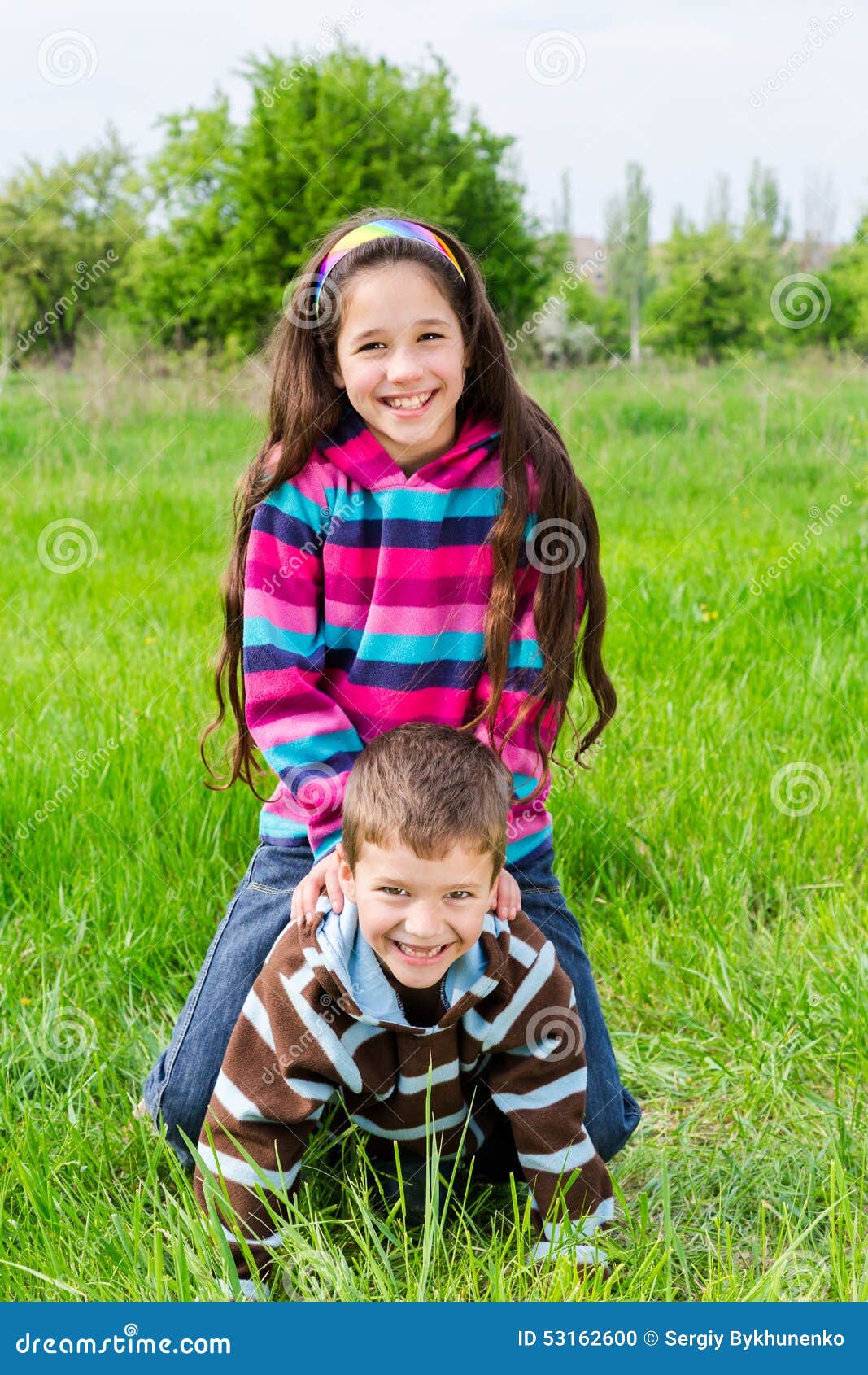 Two Kids Playing on Green Grass Stock Photo - Image of summer, playing ...