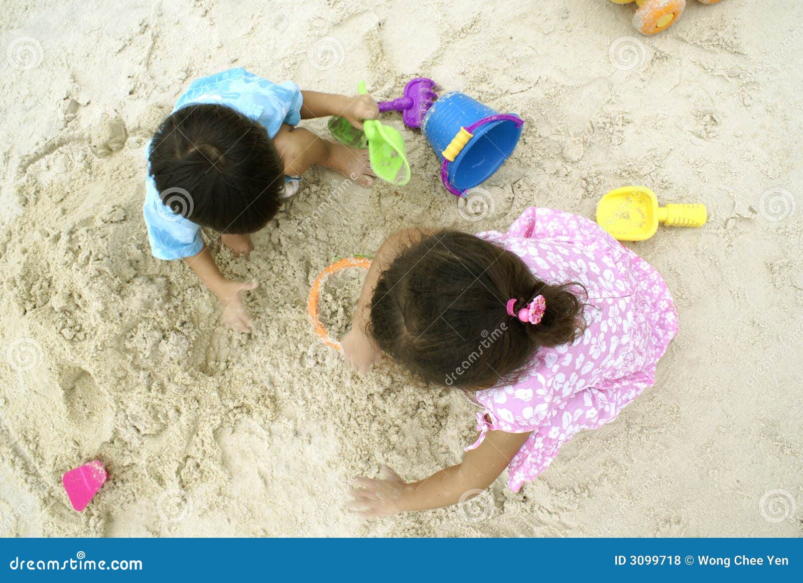 Two kids playing sand stock photo. Image of sandy, asian - 3099718