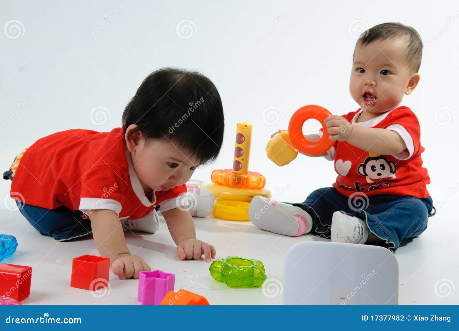 Two Kids playing toy stock photo. Image of enjoy, cheerful - 17377982