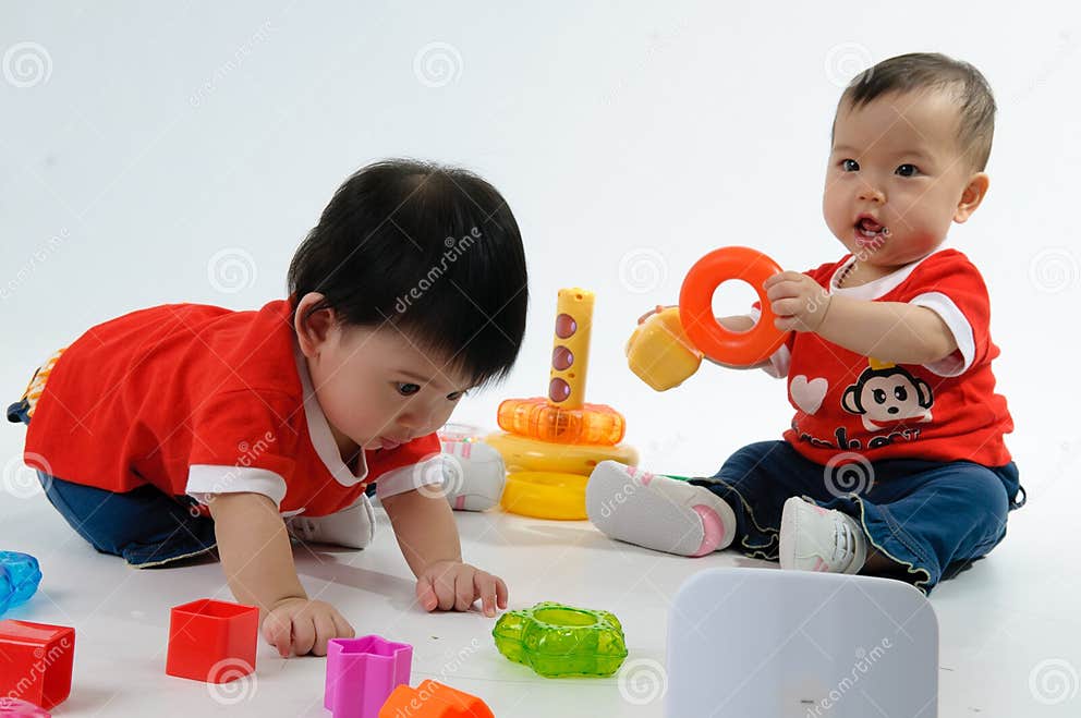 Two Kids playing toy stock photo. Image of enjoy, cheerful - 17377982