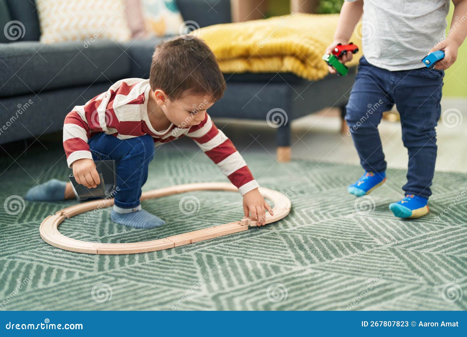 Two Kids Playing with Train Toy Sitting on Floor at Home Stock Image ...