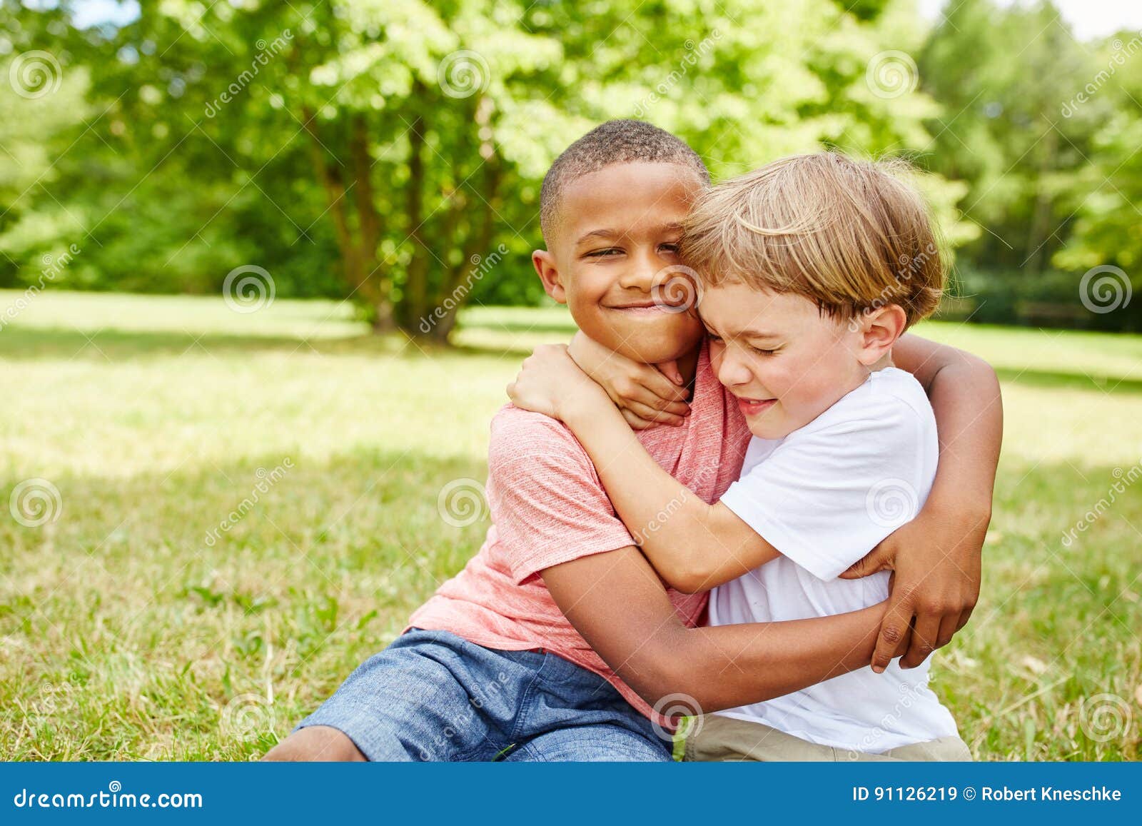 Two Kids Scuffle in the Park Stock Image - Image of friendship ...