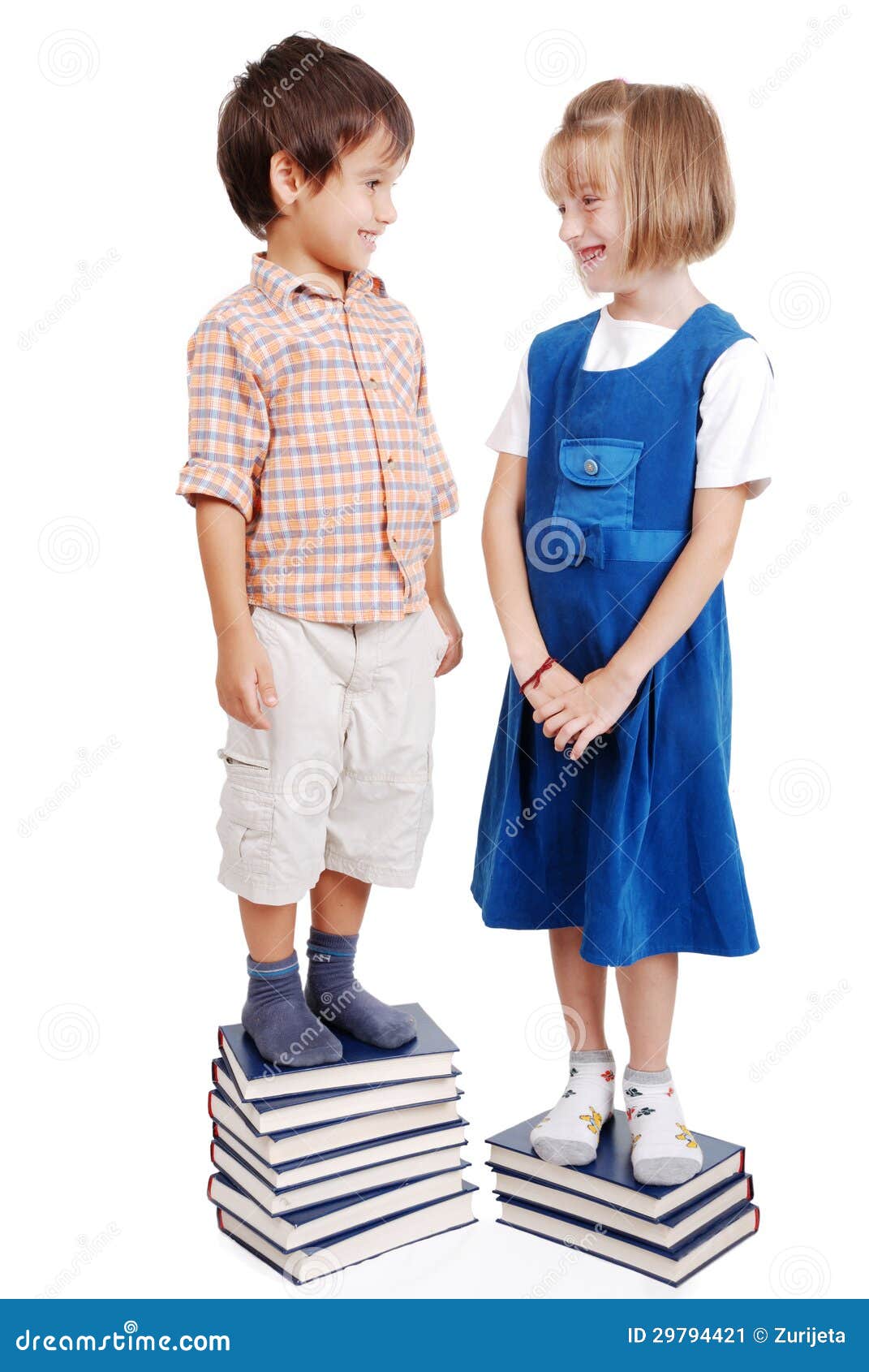 Two kids standing on books stock image. Image of pupil - 29794421