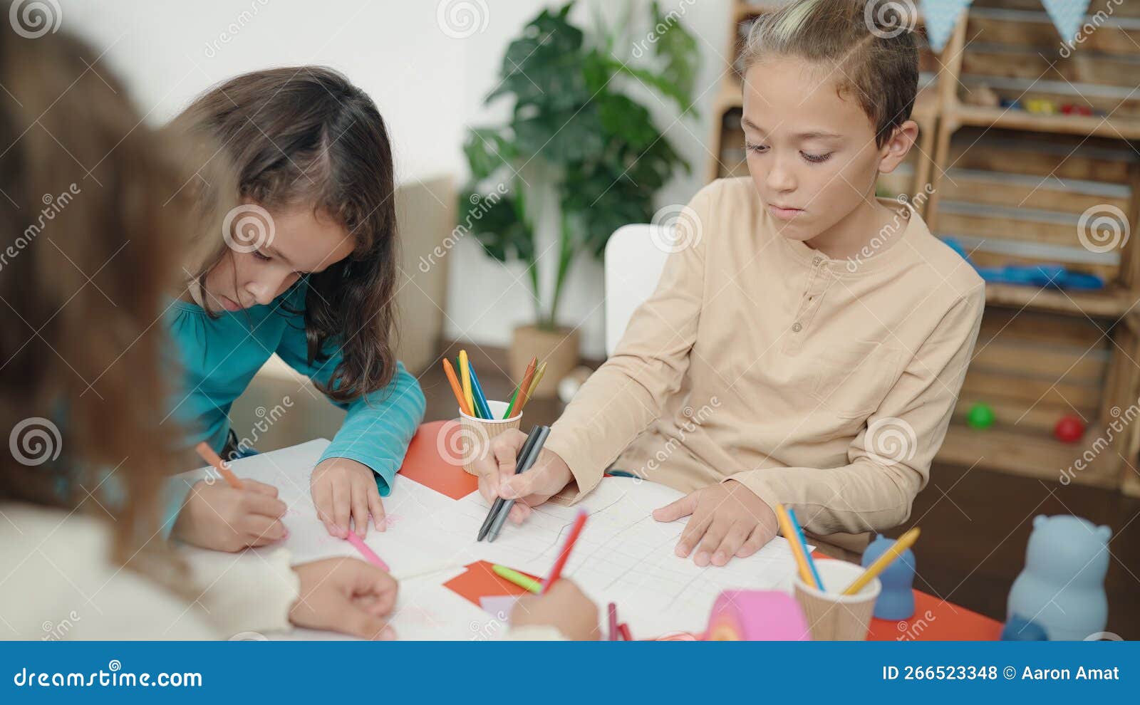 Two Kids Students Sitting on Table Drawing on Paper at Kindergarten ...