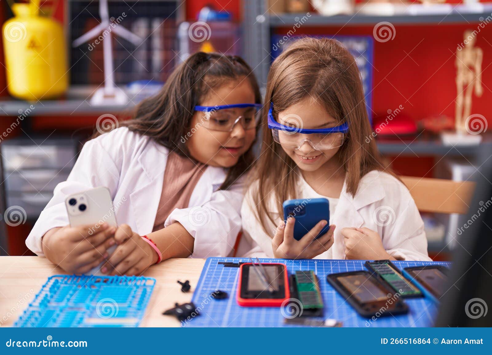 Two Kids Students Using Smartphones Standing at Laboratory Classroom ...