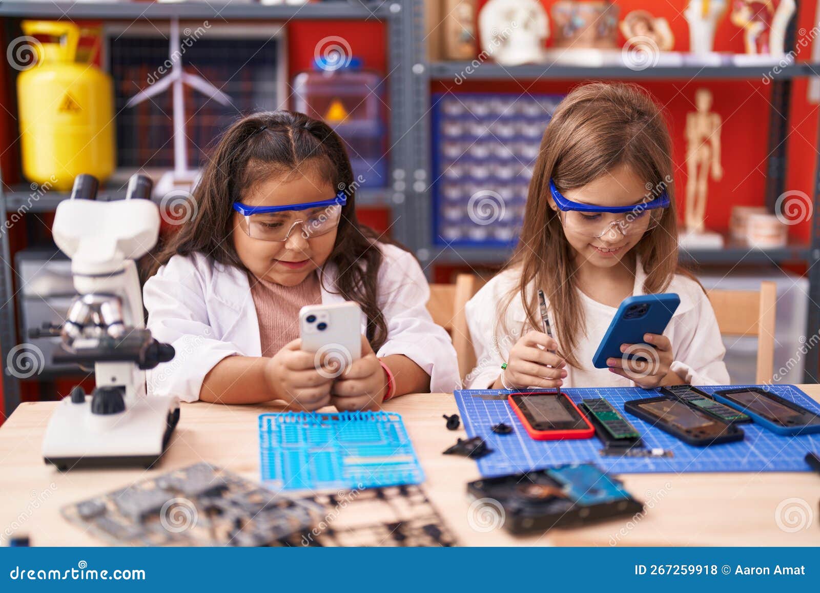 Two Kids Students Using Smartphones Standing at Laboratory Classroom ...