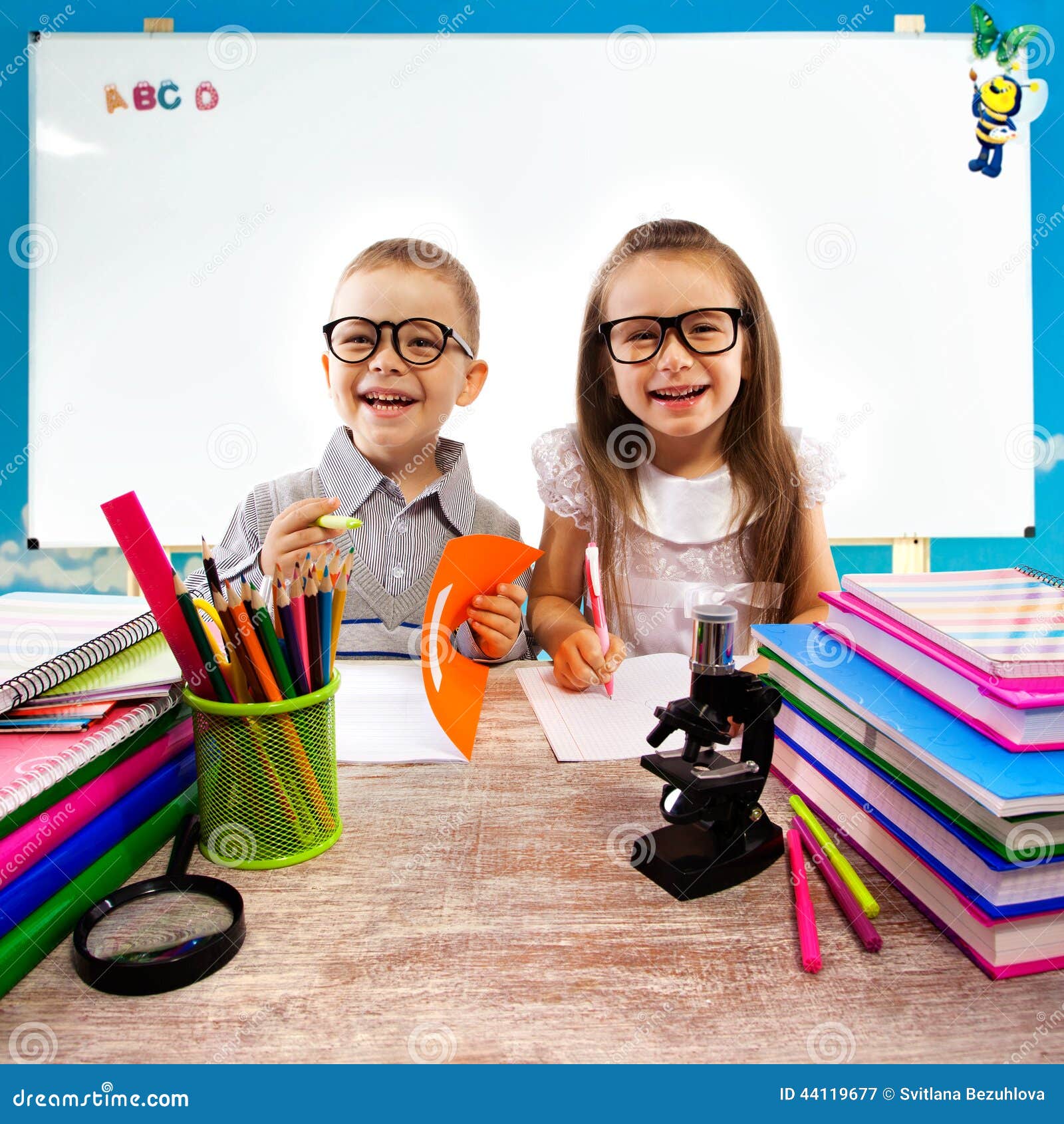Two Kids at the Table in Classroom on Lesson Stock Image - Image of ...