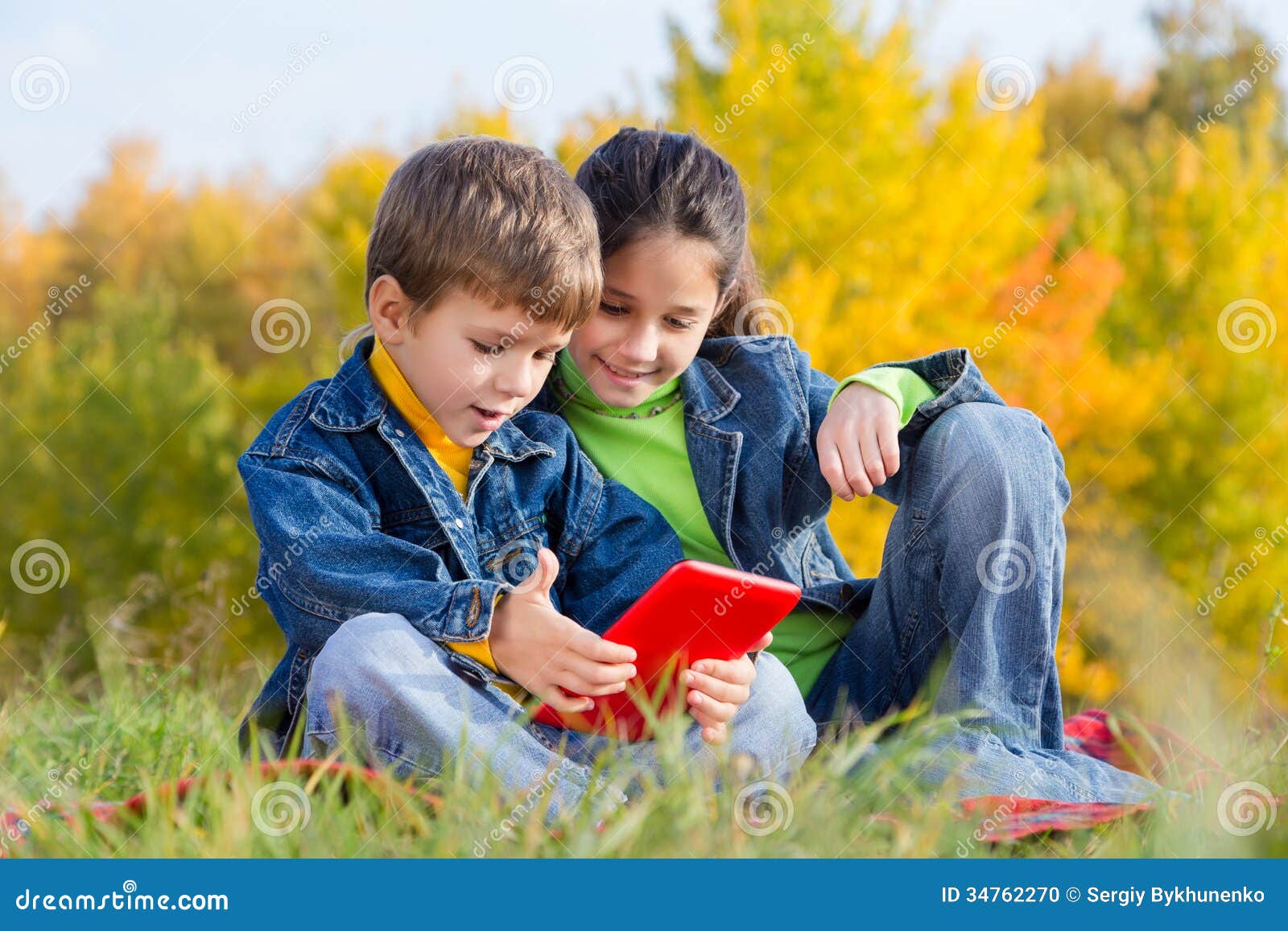 Two kids with tablet PC stock photo. Image of electronic - 34762270
