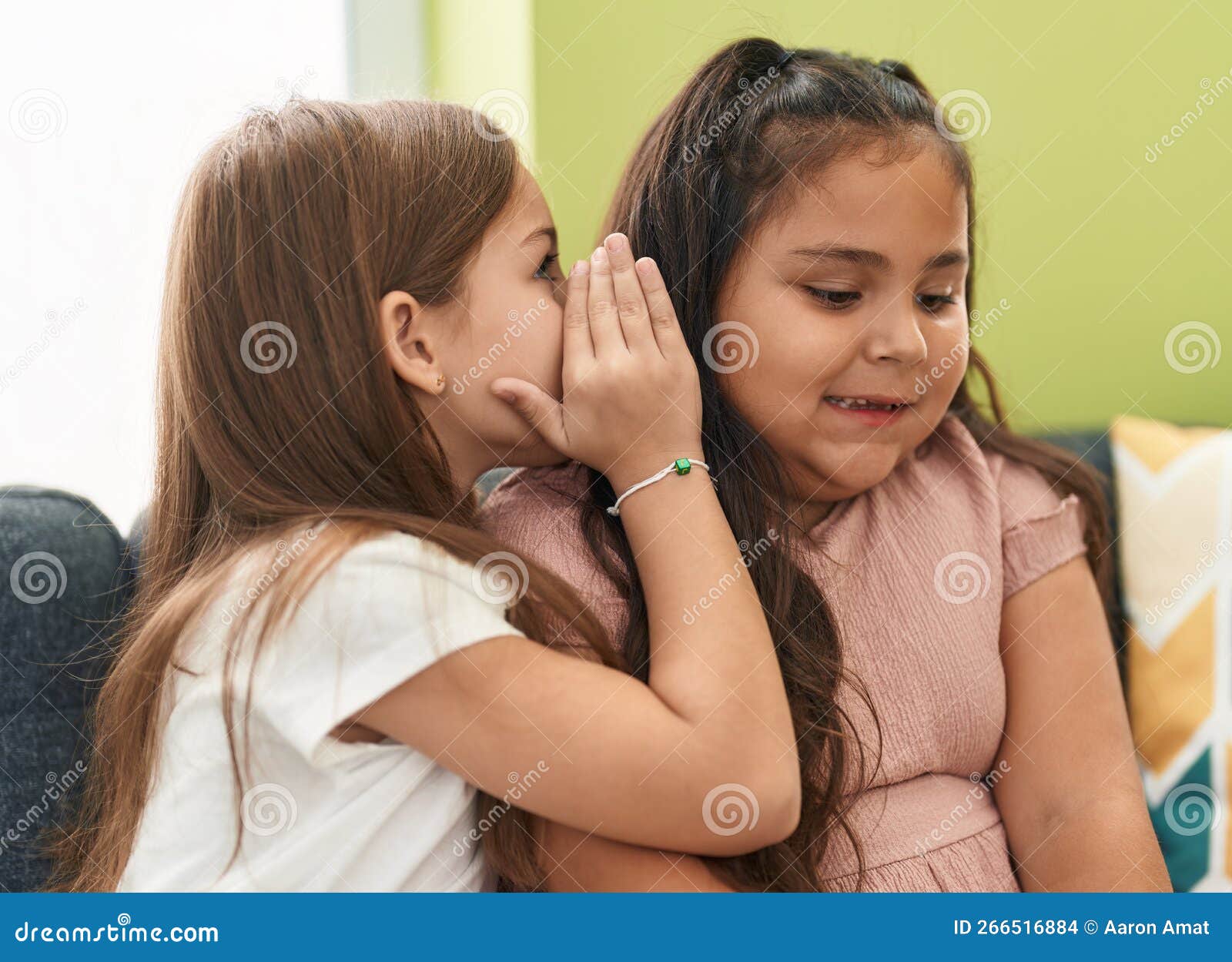 Two Kids Telling Secret Sitting on Sofa at Home Stock Photo - Image of ...