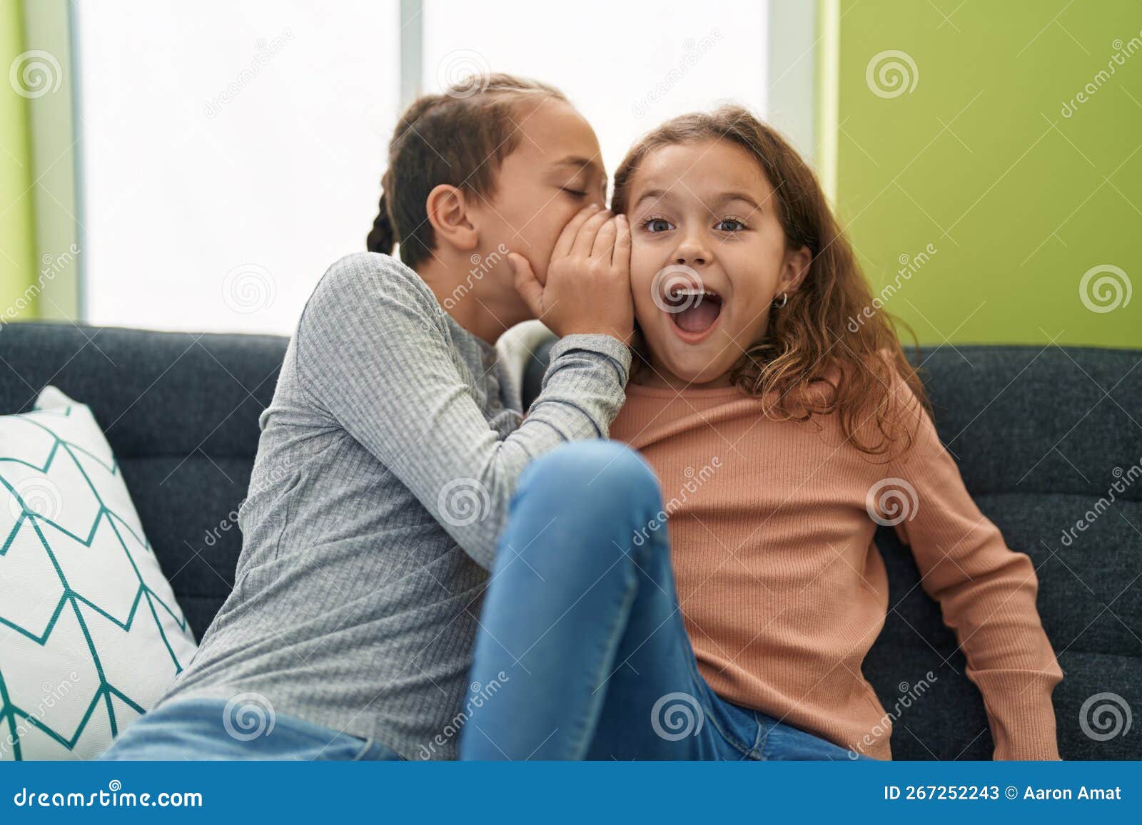 Two Kids Telling Secret Sitting on Sofa at Home Stock Image - Image of ...