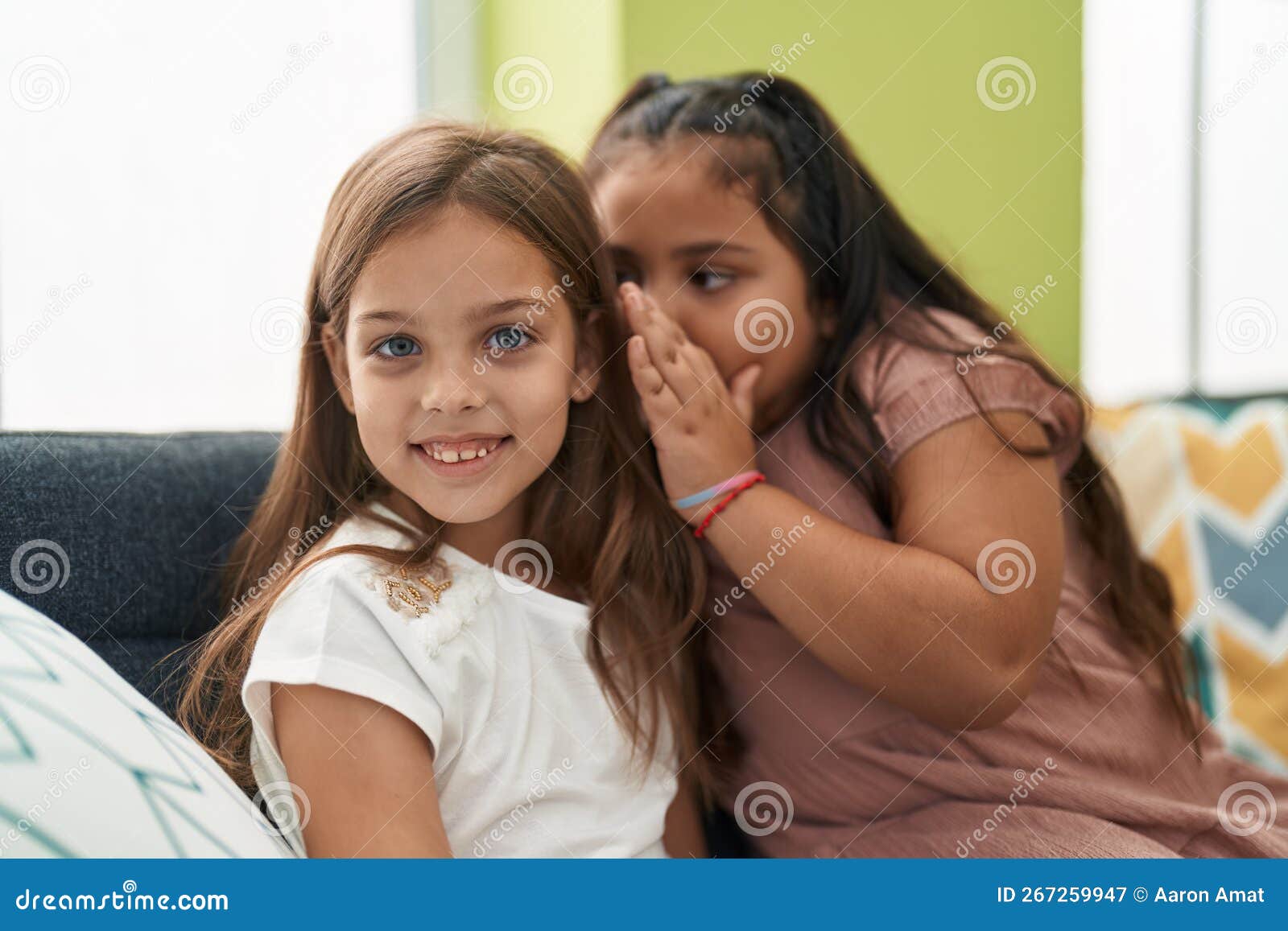 Two Kids Telling Secret Sitting on Sofa at Home Stock Image - Image of ...