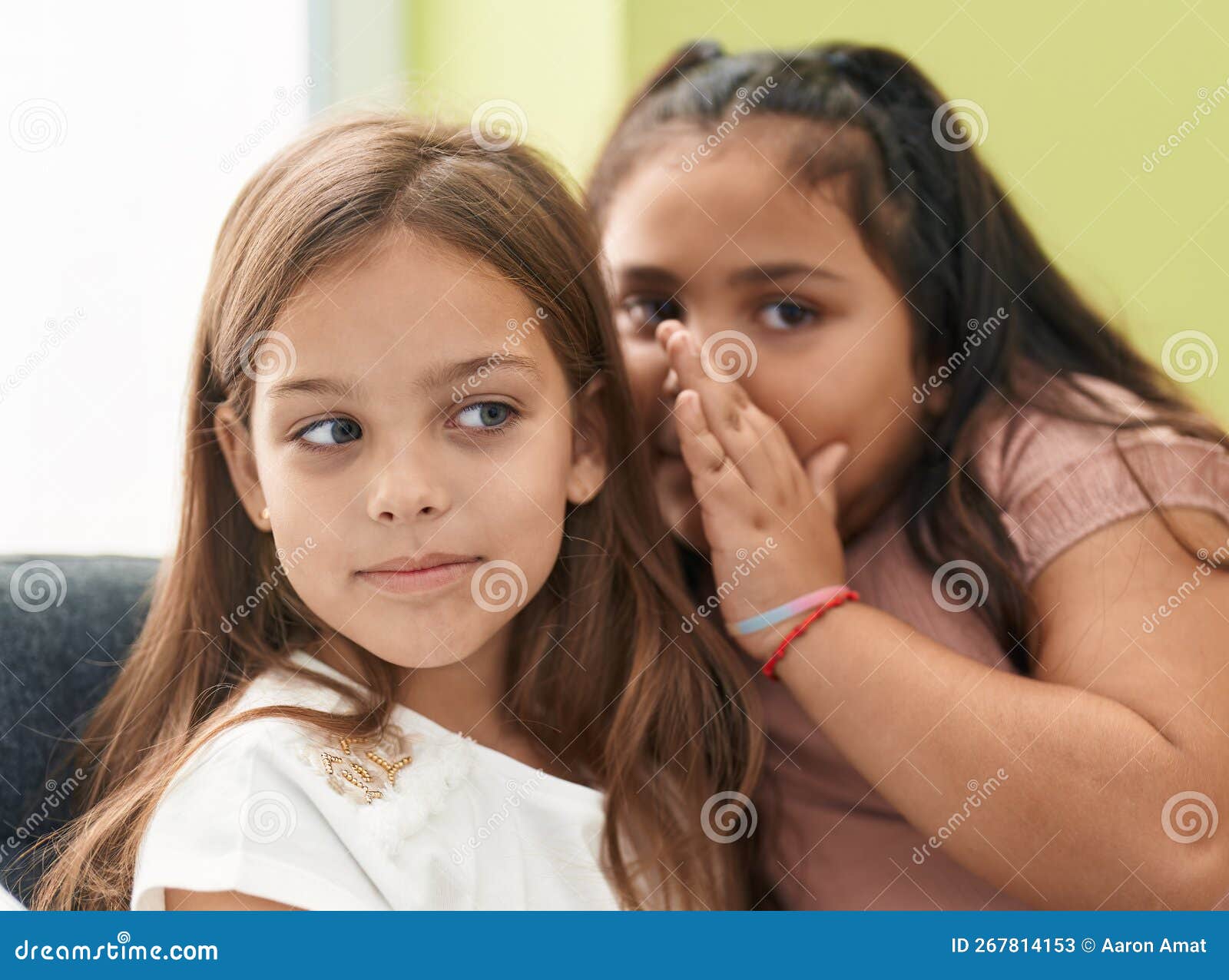 Two Kids Telling Secret Sitting on Sofa at Home Stock Image - Image of ...