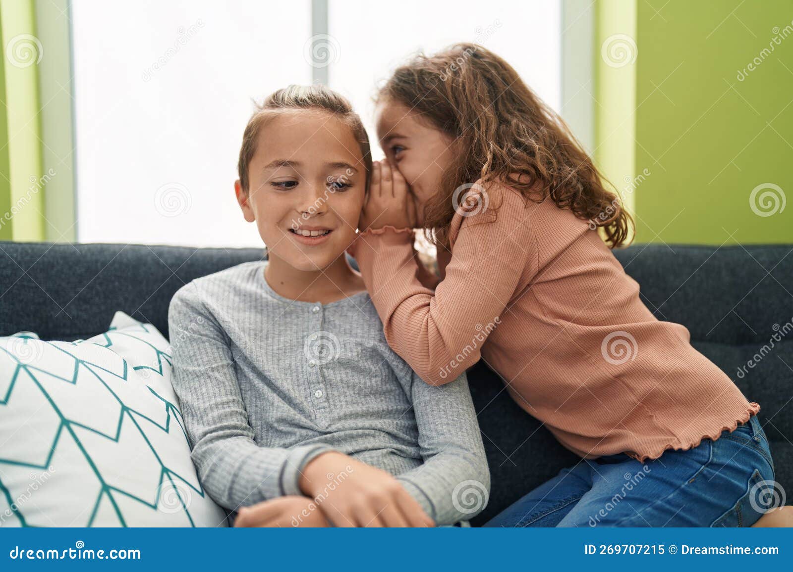 Two Kids Telling Secret Sitting on Sofa at Home Stock Image - Image of ...