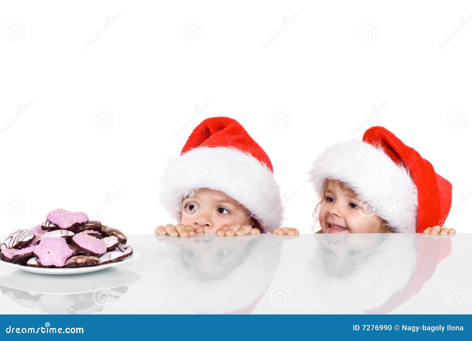 Two Kids Yearning for the Christmas Cookies Stock Photo - Image of ...