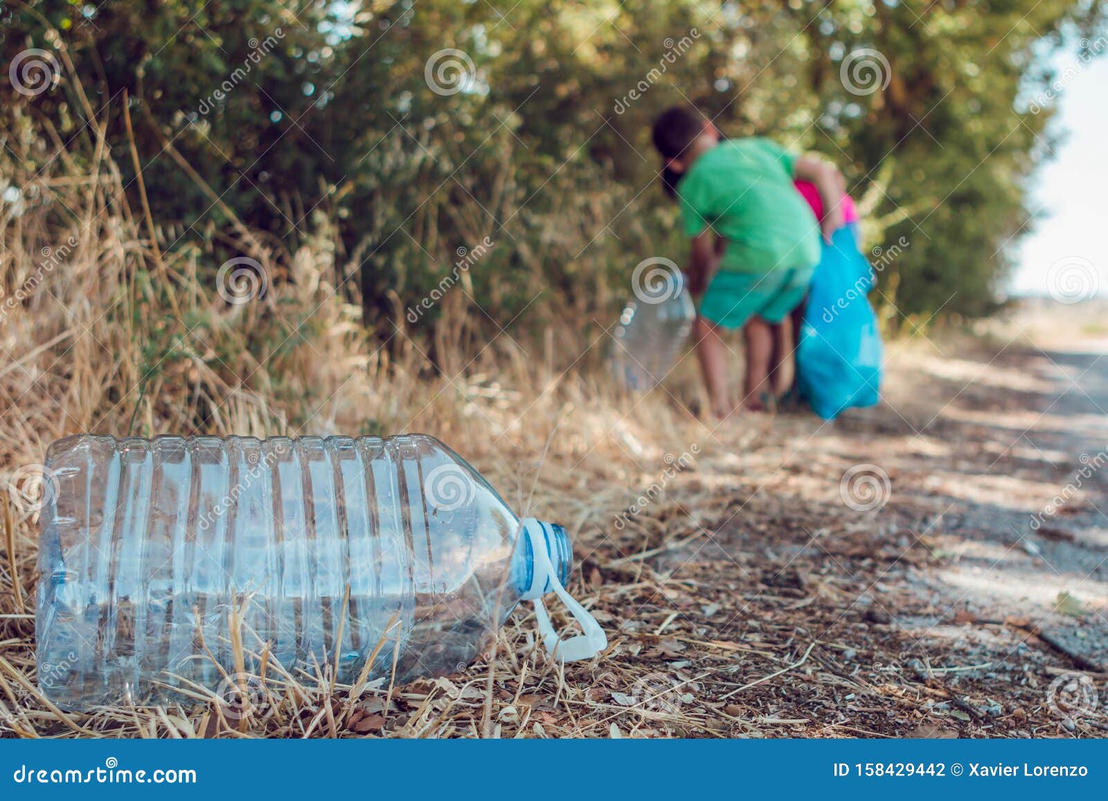 Two Kind Children Doing School Tasks and Collecting Garbage with a ...