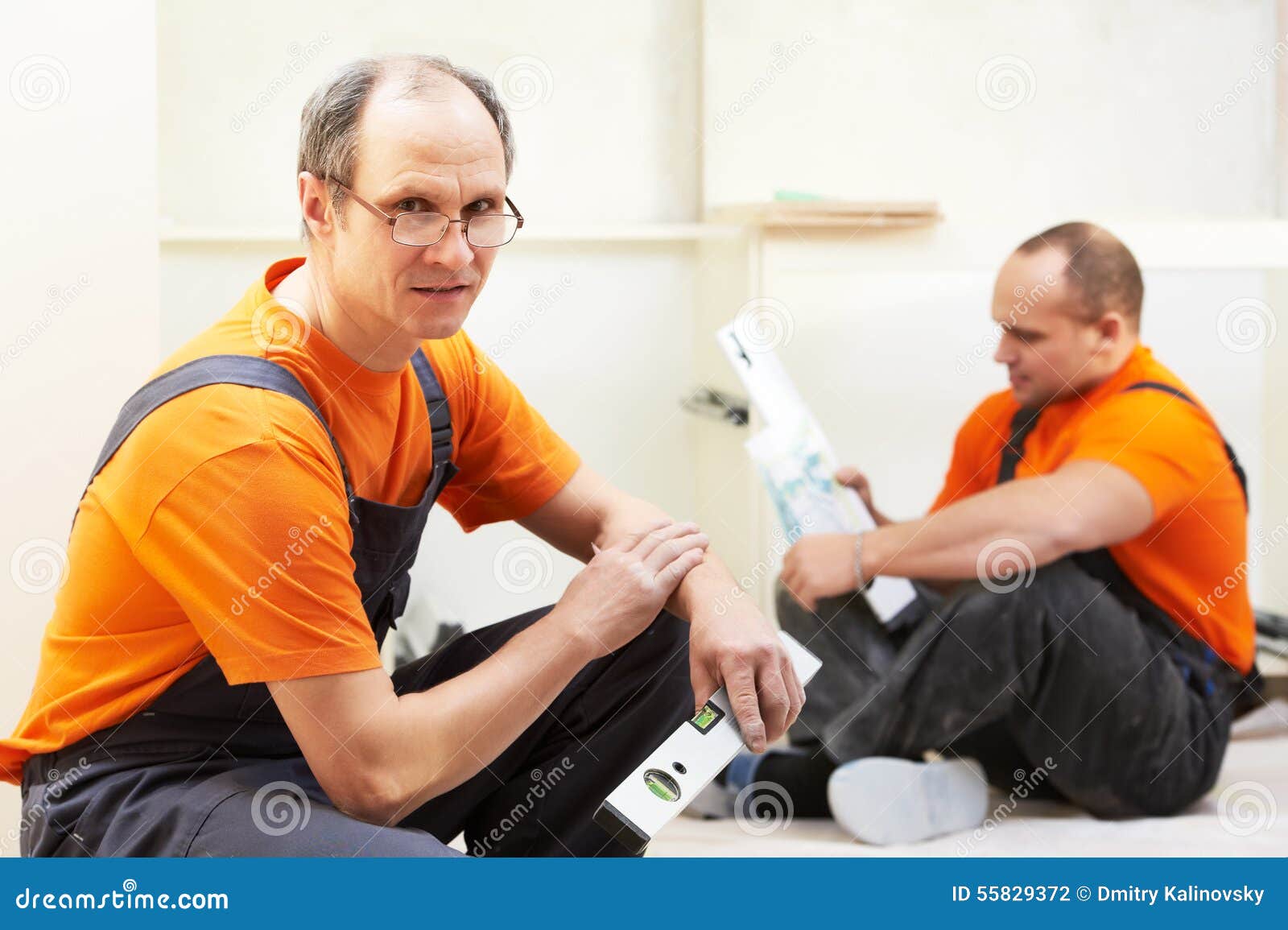 Two Kitchen Installers at Carpenter Work Stock Photo - Image of laborer ...
